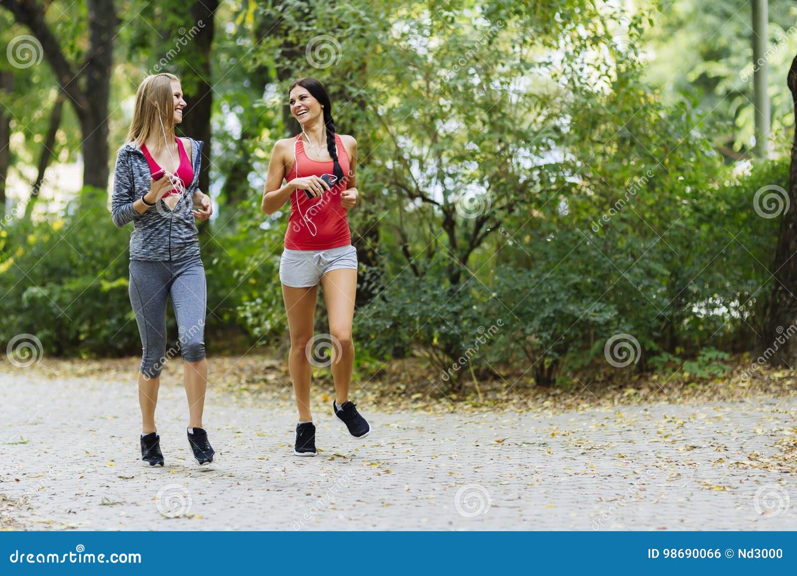 Athletic Women Jogging in Nature Stock Photo - Image of activity ...