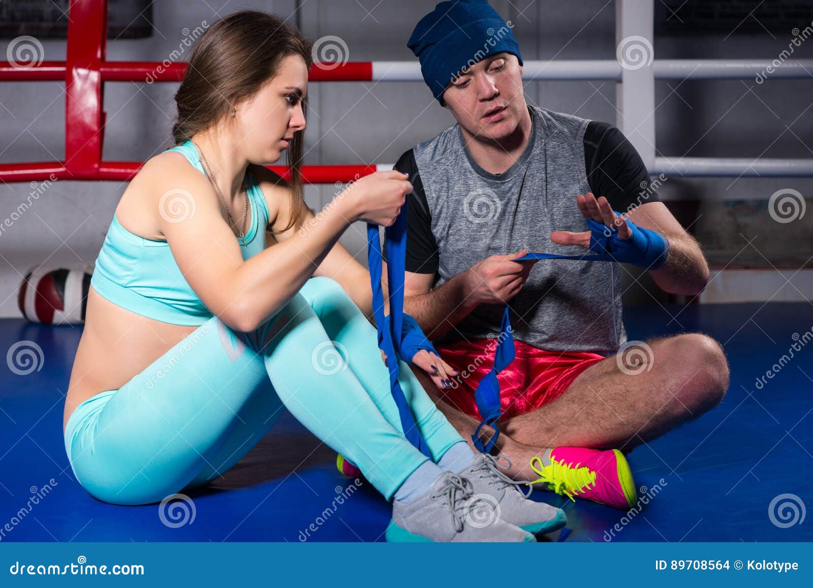 Athletic Young Boxing Couple Preparing Bandages Stock Photo - Image of ...