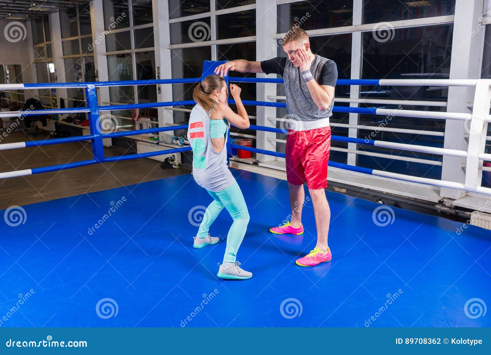 Athletic Young Couple in Sportswear Practicing Boxing in Regular Stock ...