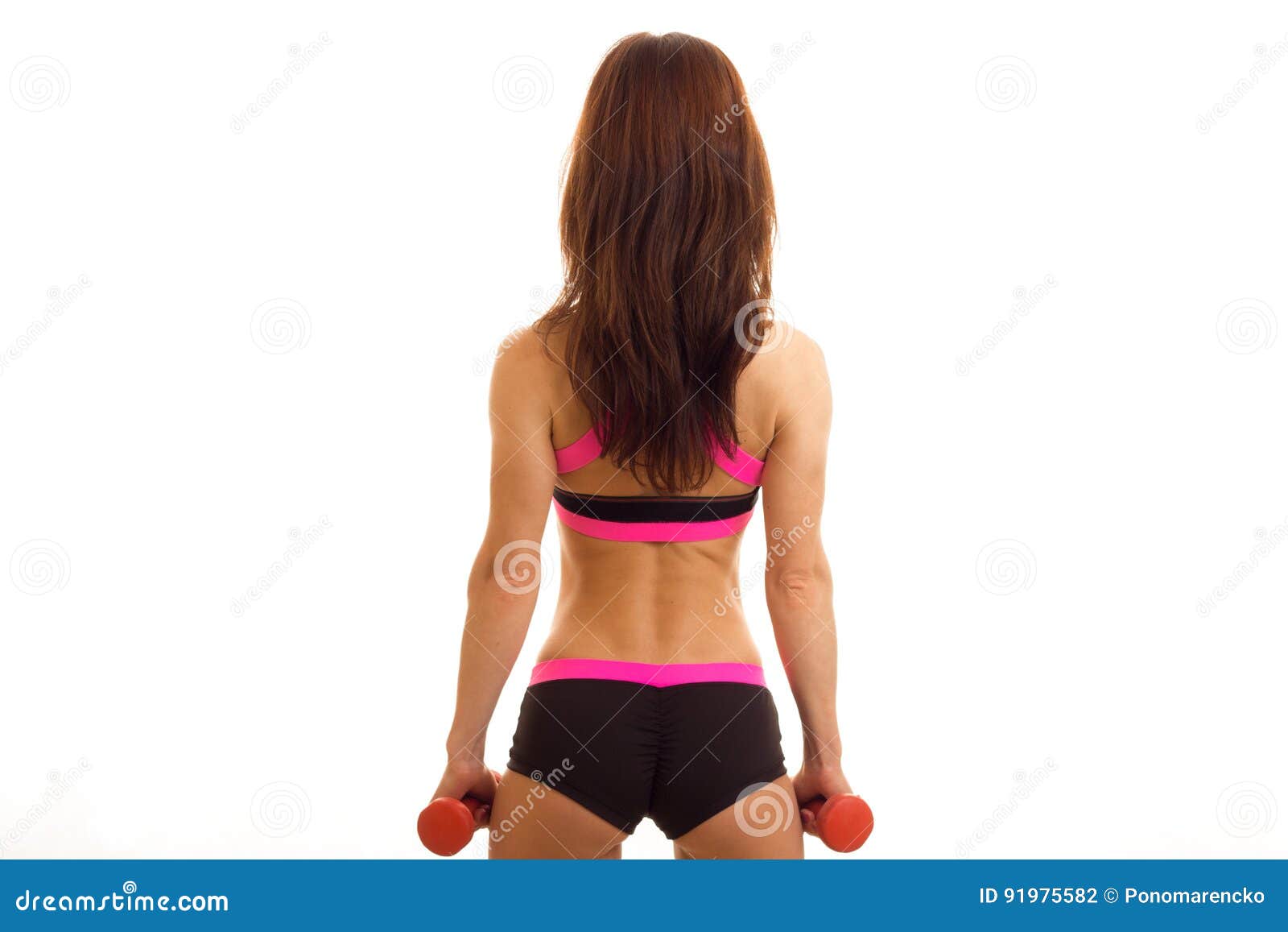 Athletic Young Girl With Supple Buttocks In Black Shorts Turned Back To