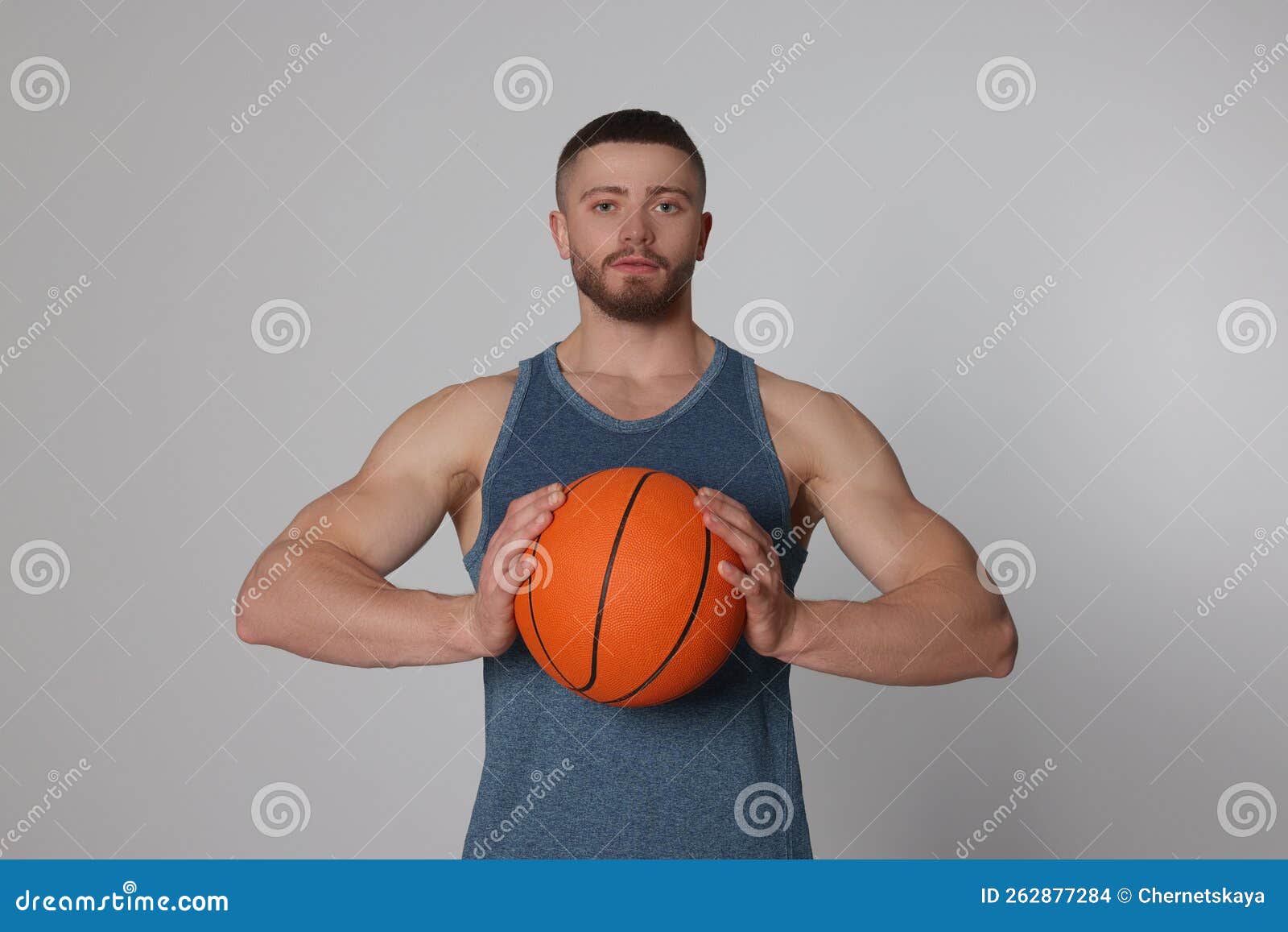 Athletic Young Man with Basketball Ball on Light Grey Background Stock ...