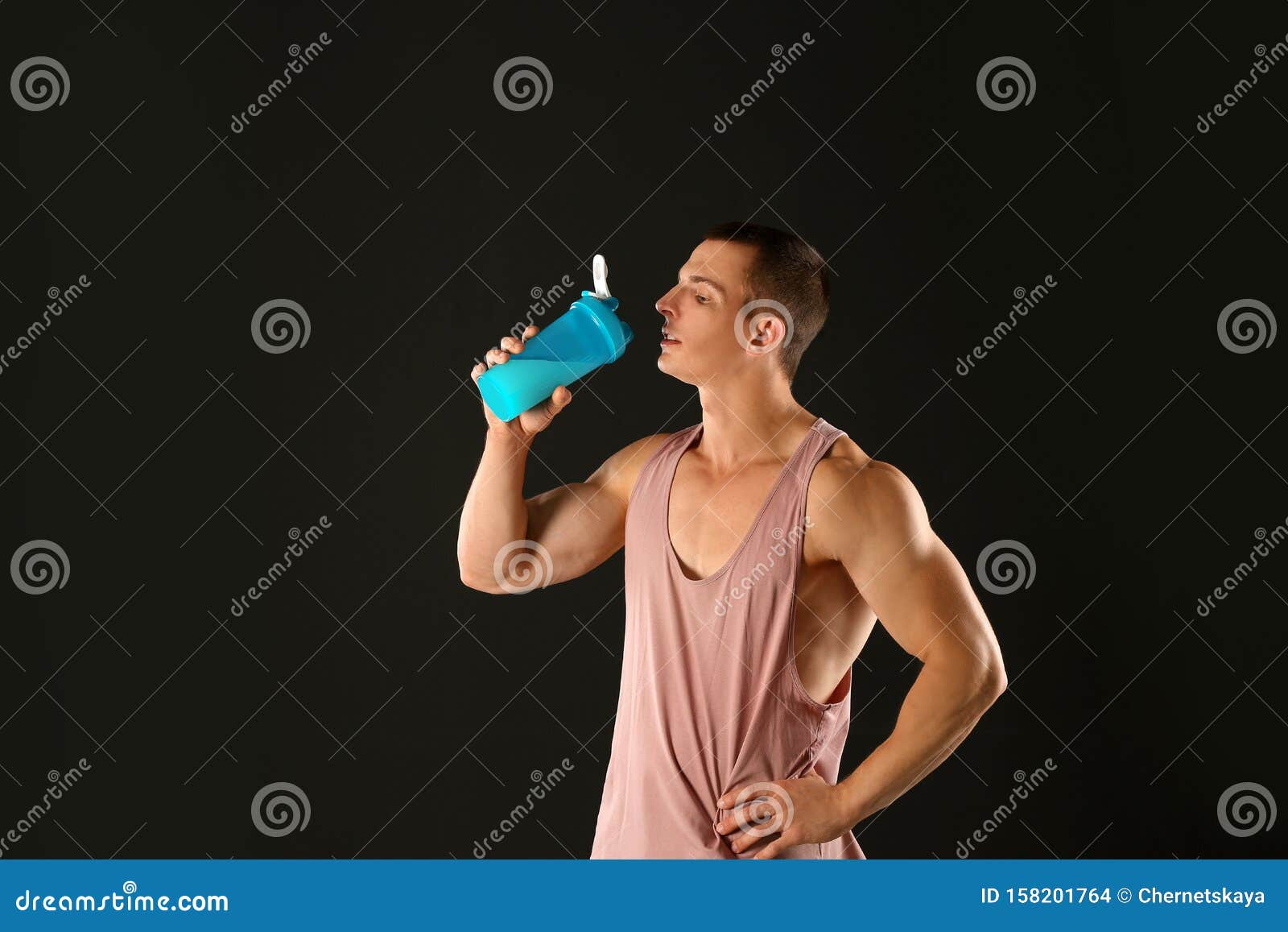 Athletic Young Man Drinking Shake on Black Background Stock Photo ...