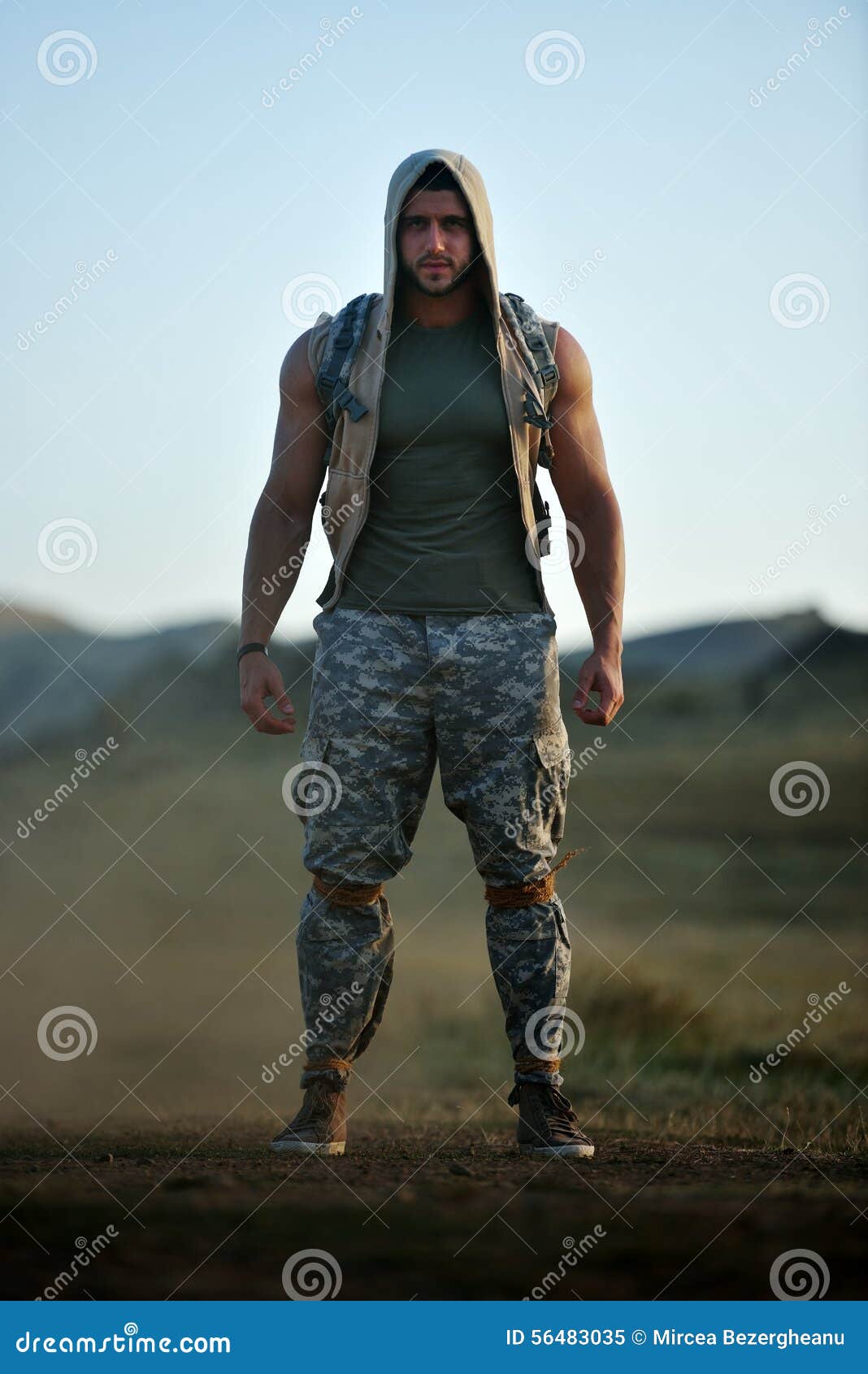 Athletic Young Man on Dusty Field Stock Image - Image of fashion ...