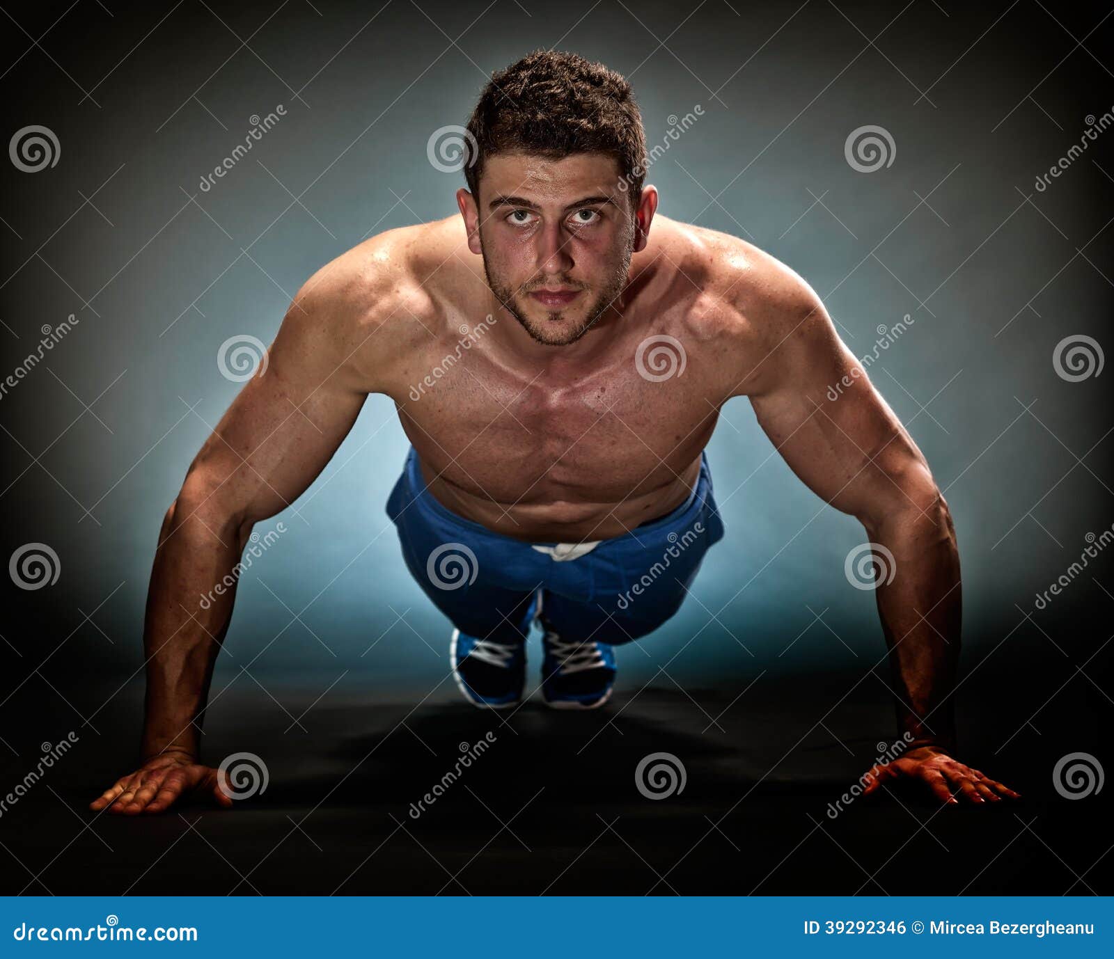 Athletic Young Man Exercising Stock Photo - Image of attractive ...