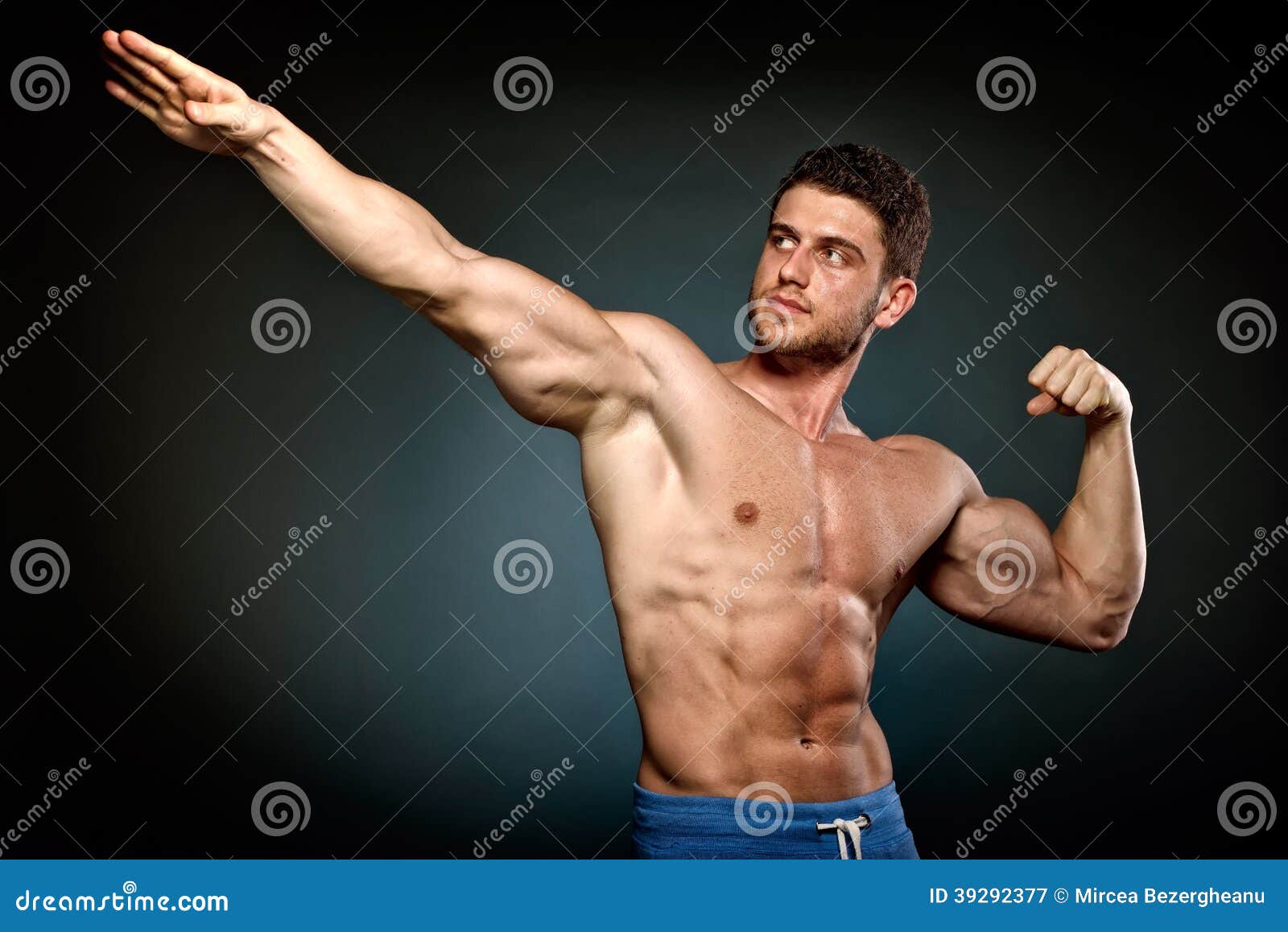 Athletic Young Man Exercising Stock Image - Image of muscles, body ...