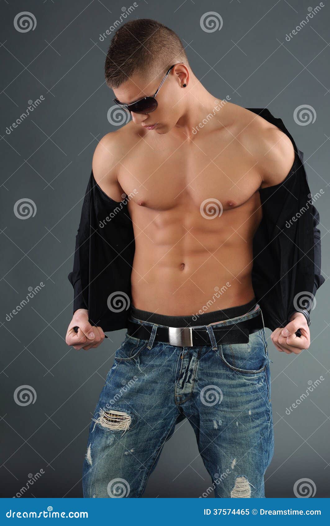 Athletic Young Man Off His Shirt Stock Image - Image of standing ...