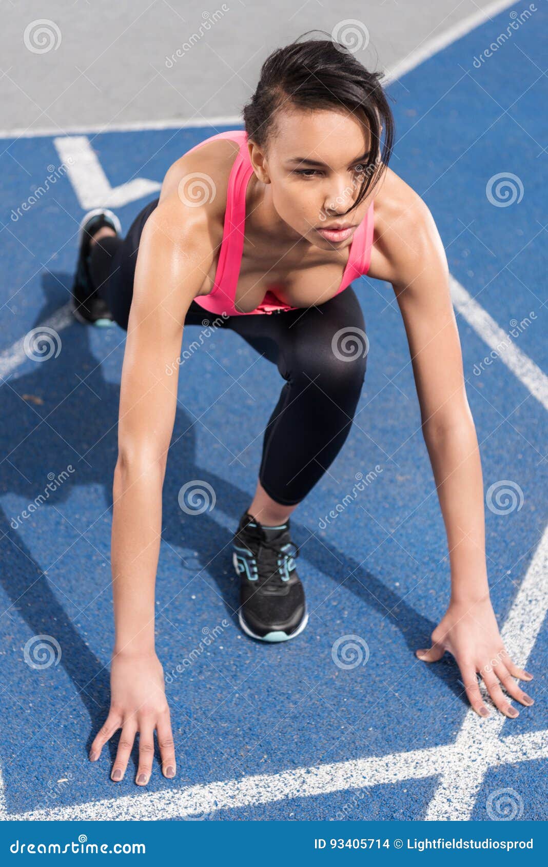 Athletic Young Runner on Starting Line at Running Track Stadium Stock ...