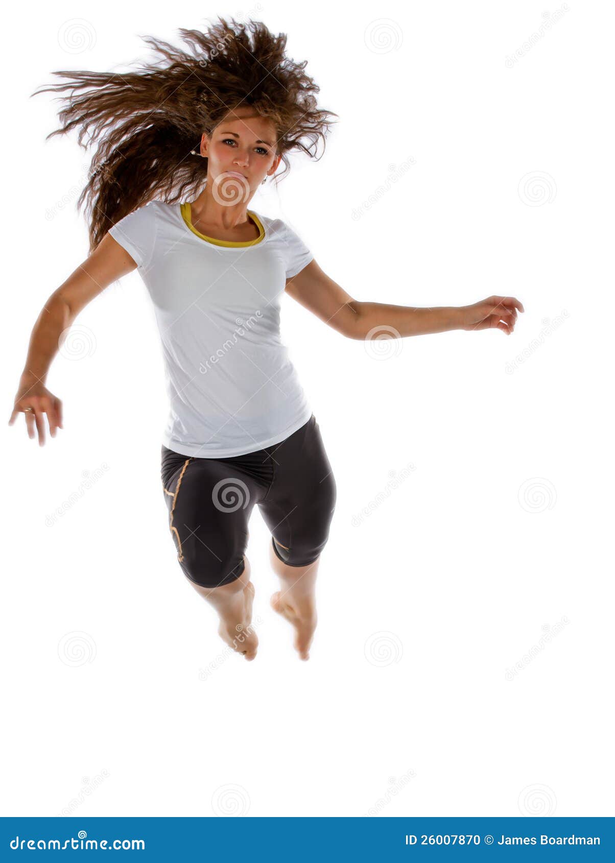Athletic Young Woman Leaping Towards the Camera Stock Photo - Image of ...