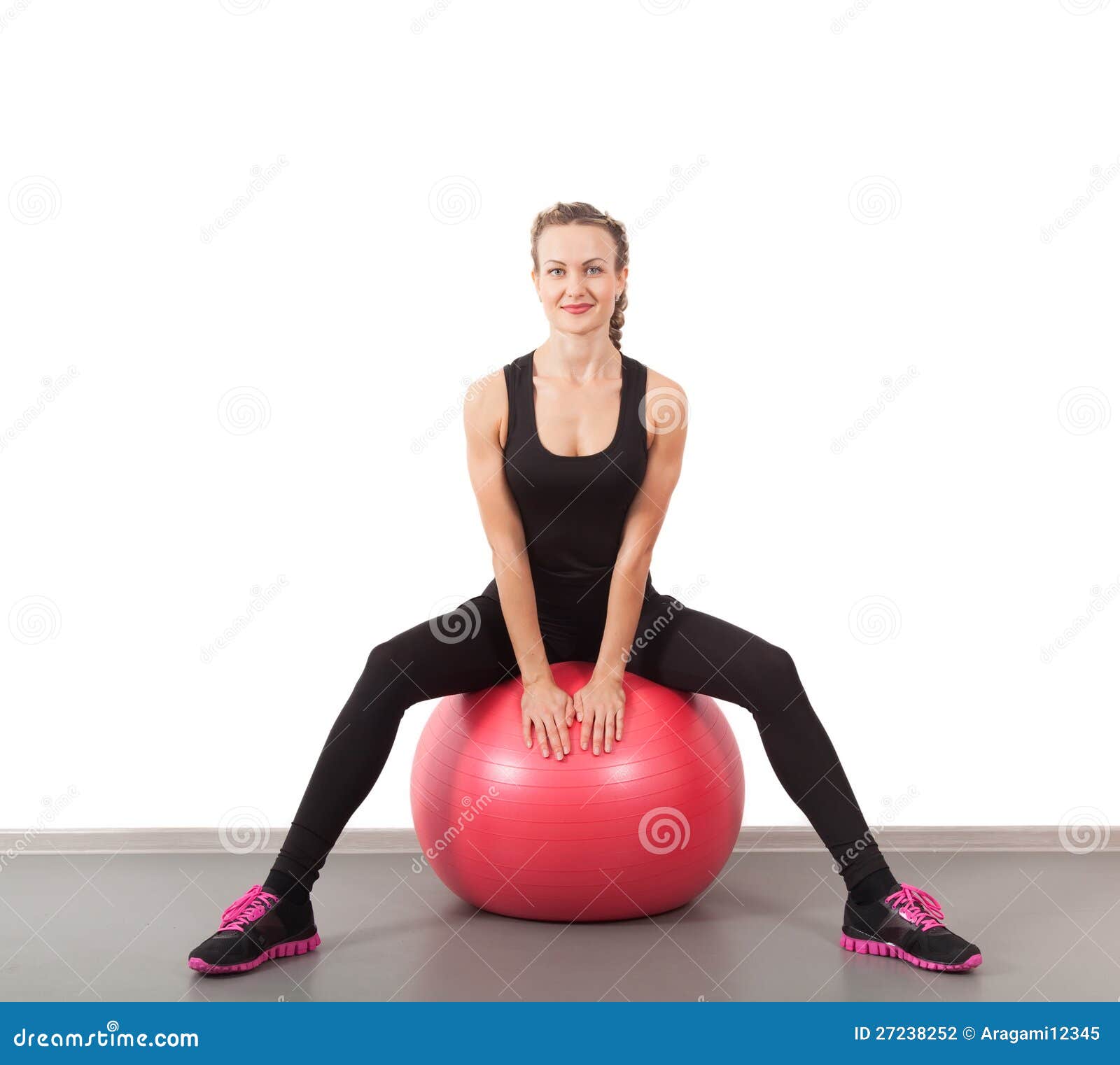 Athletic Young Woman on Red Ball Stock Photo - Image of healthy, happy ...