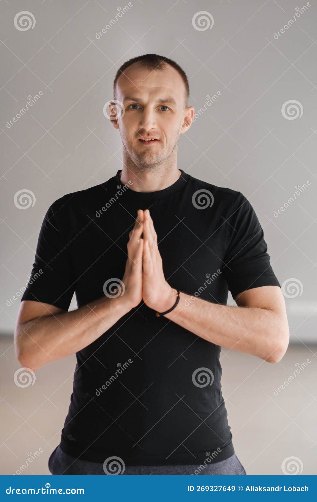 An Athletically Built Man Does Yoga in the Gym on a Mat Stock Image ...