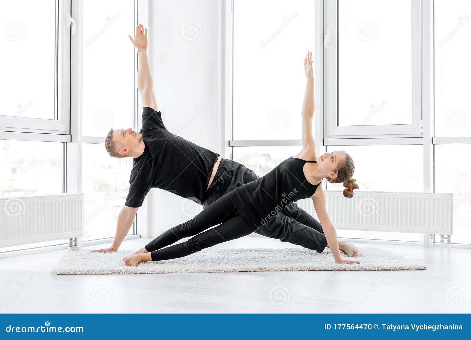 Athlets Performing Side Plank Exercise Stock Photo - Image of ...