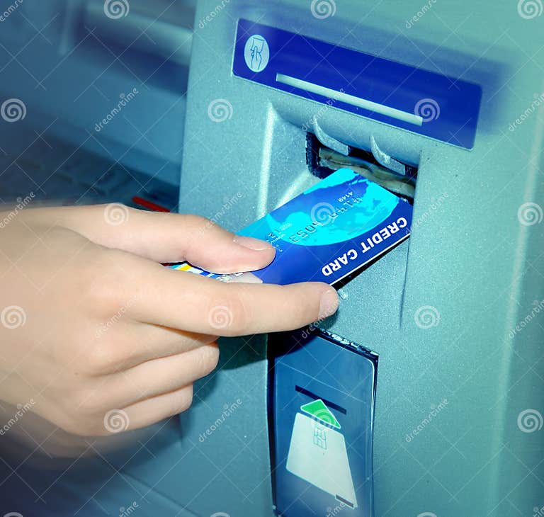 ATM. Inserting a Card. stock photo. Image of card, charge - 1415110