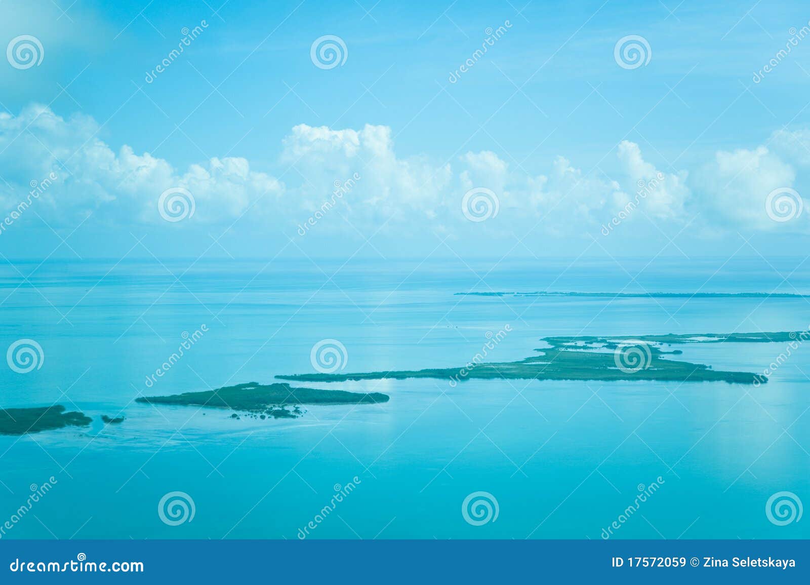 Atolls in the ocean stock image. Image of remote, calm - 17572059