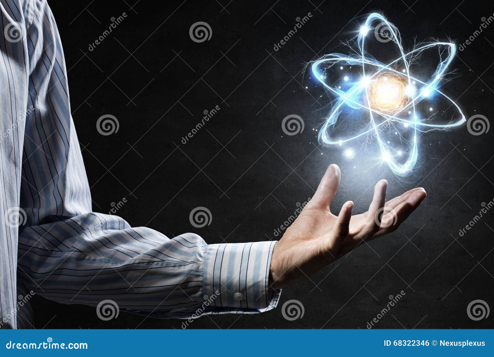 Atom icon in palm stock photo. Image of sign, shiny, conservation ...