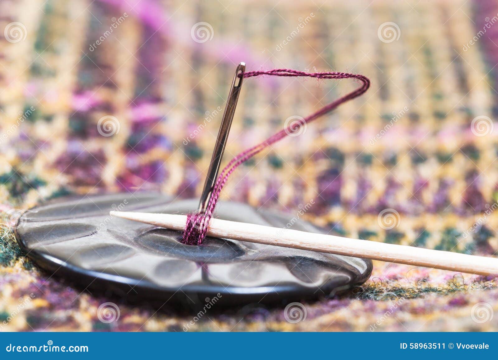 Attaching Of Button To Green Tweed By Needle Royalty-Free Stock Photo ...