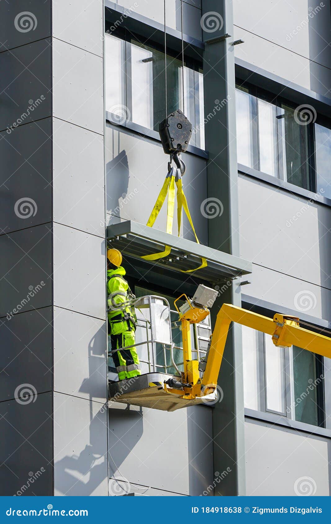 Attaching the Finishing Element of the House Facade Using a Scissor ...