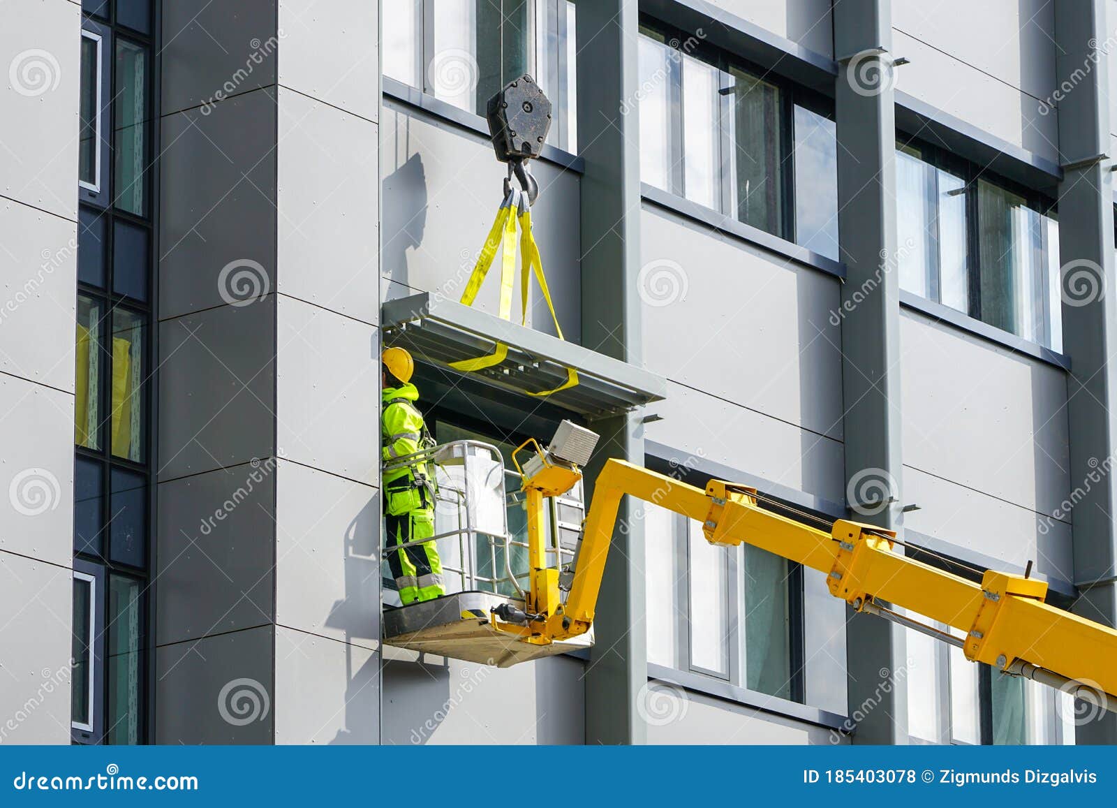 Attaching the Finishing Element of the House Facade Using a Scissor ...