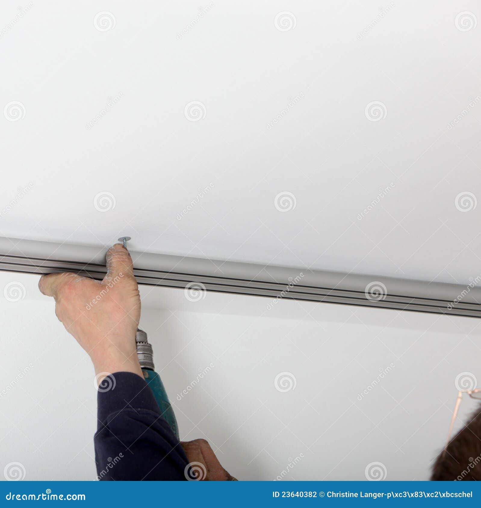 Attaching Metal Track To Ceiling Stock Photo - Image of attach ...