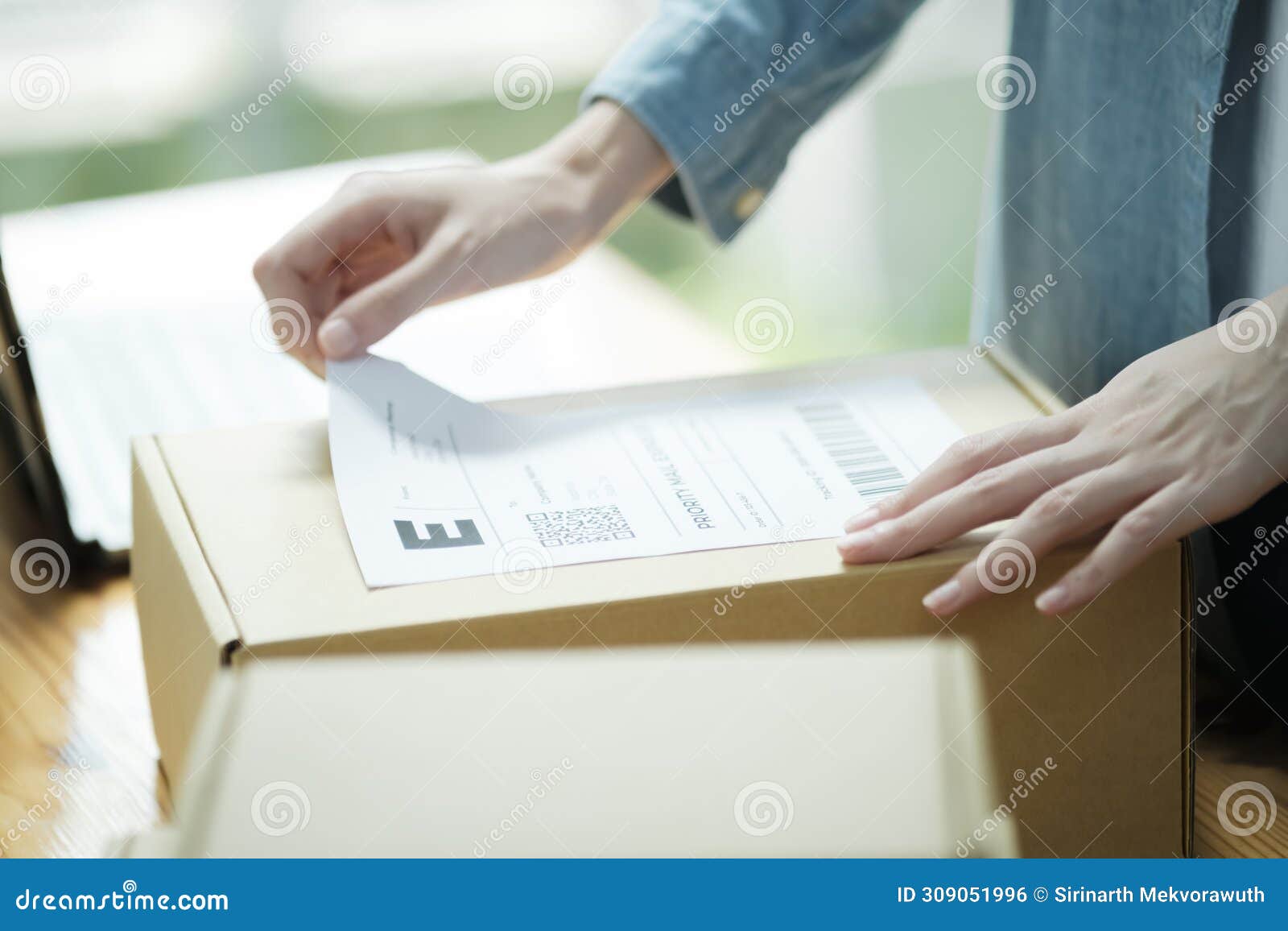 Attaching Shipping Label To a Parcel Stock Photo - Image of ...