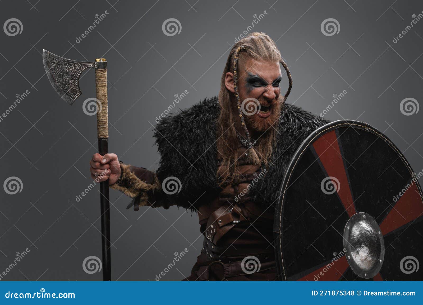 Attacking Viking Barbarian with Rounded Shield and Axe Stock Photo ...
