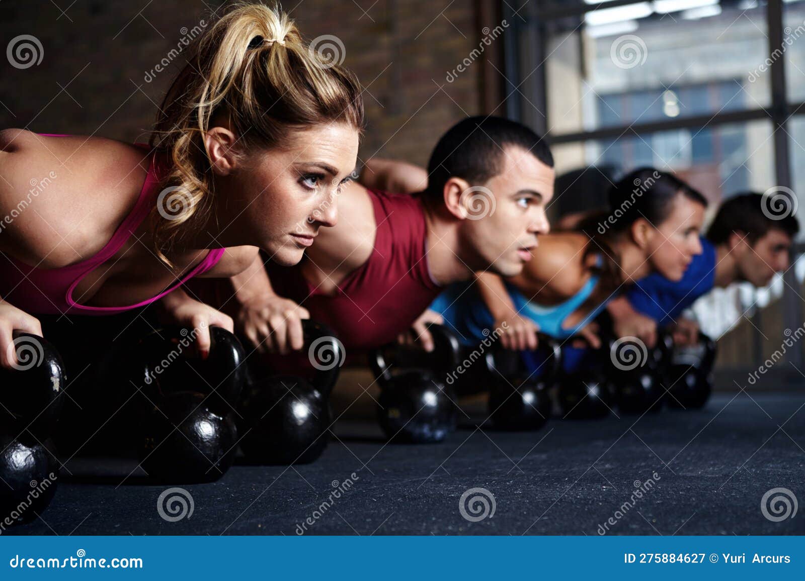 They Attend the Same Weight Training Class. a Group of Young Men and ...