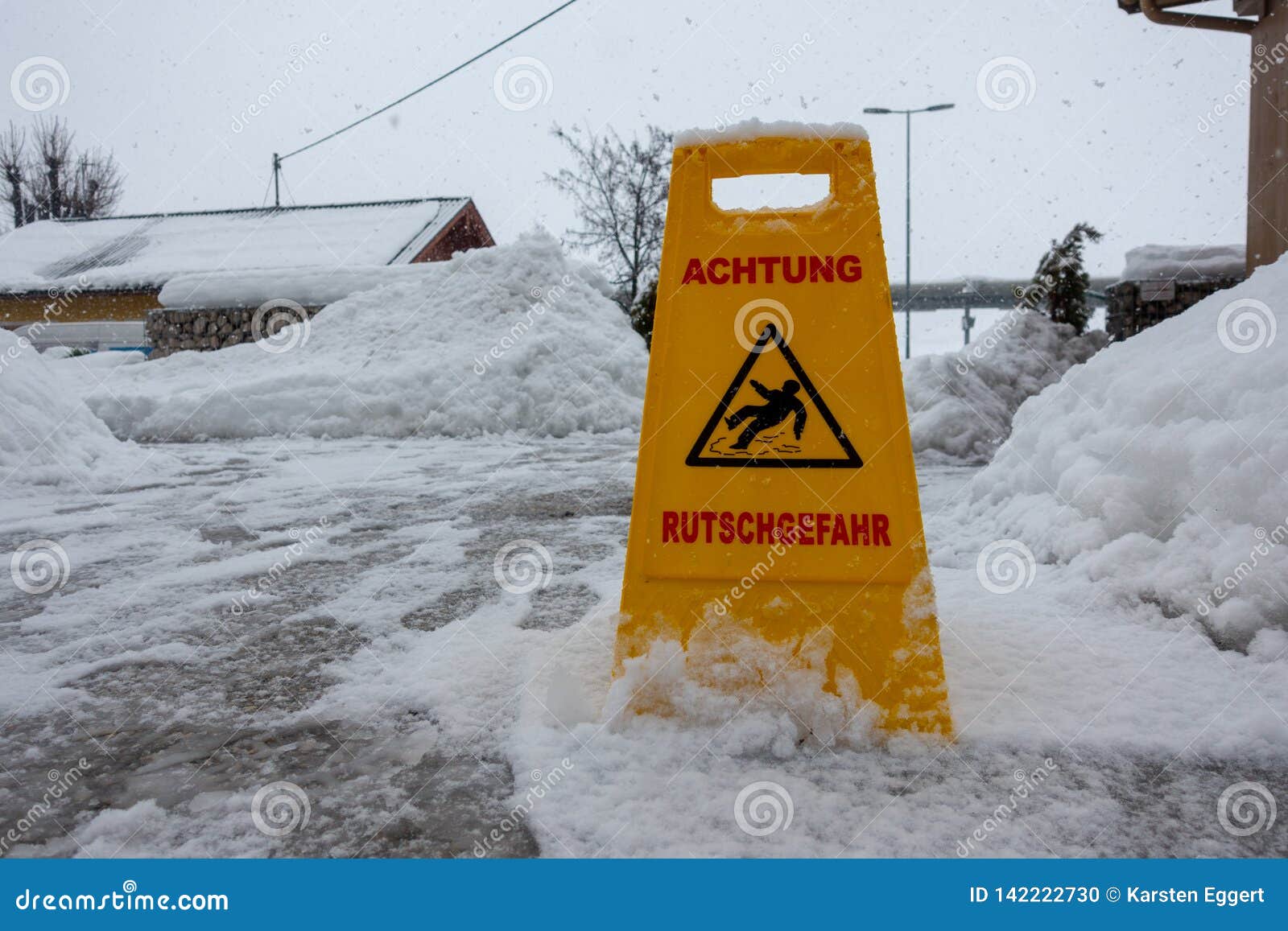 Attention Danger of Slipping on a Yellow Sign Stock Photo - Image of ...