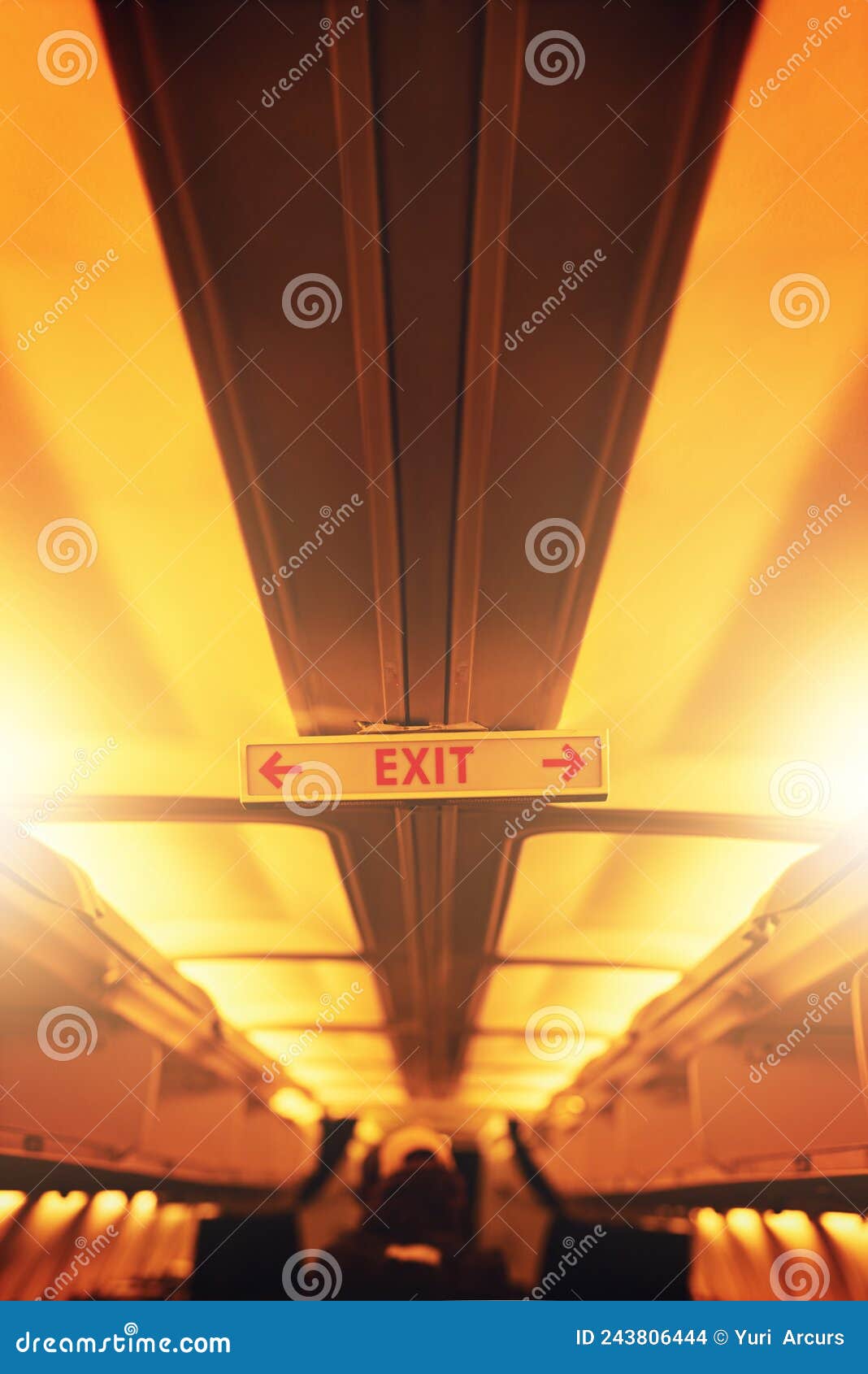 Attention Passengers Please Take Note of the Emergency Exits. Shot of ...
