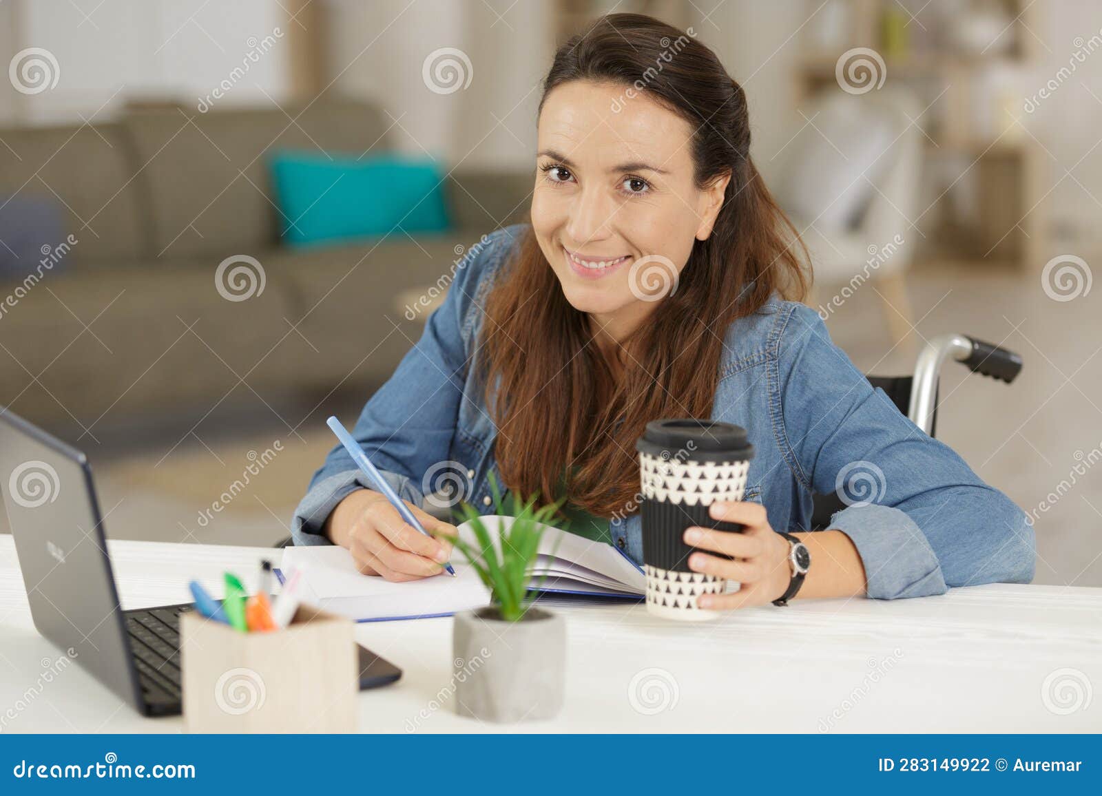 Attentive Disable Woman Looking at Notes at Home Stock Photo - Image of ...