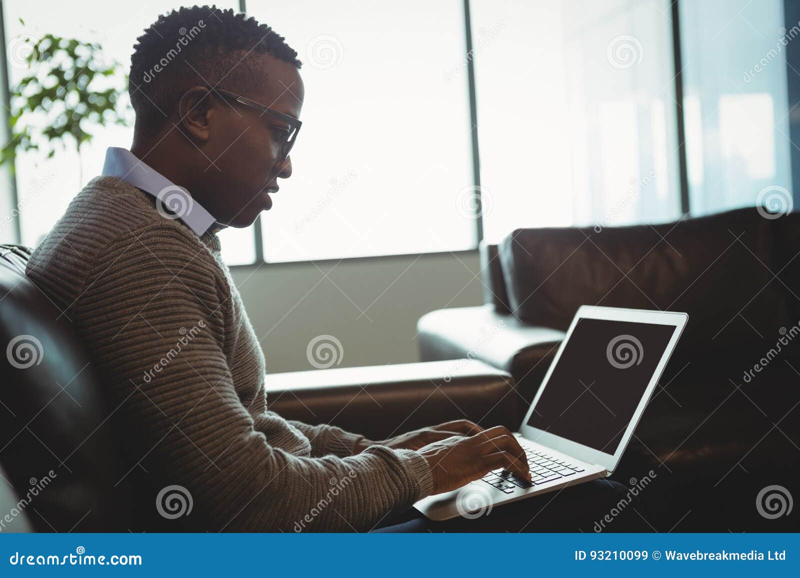 Attentive Executive Using Laptop Stock Image - Image of black, male ...
