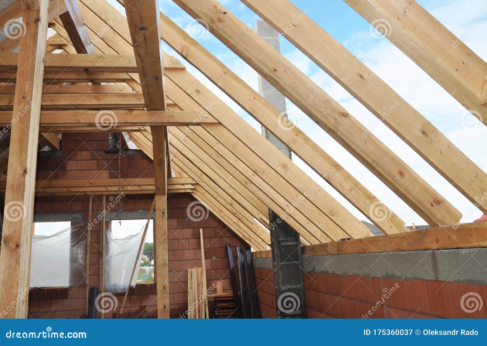 Attic Roof Beams Against Blue Sky. Constructing Rooftop Frame from ...