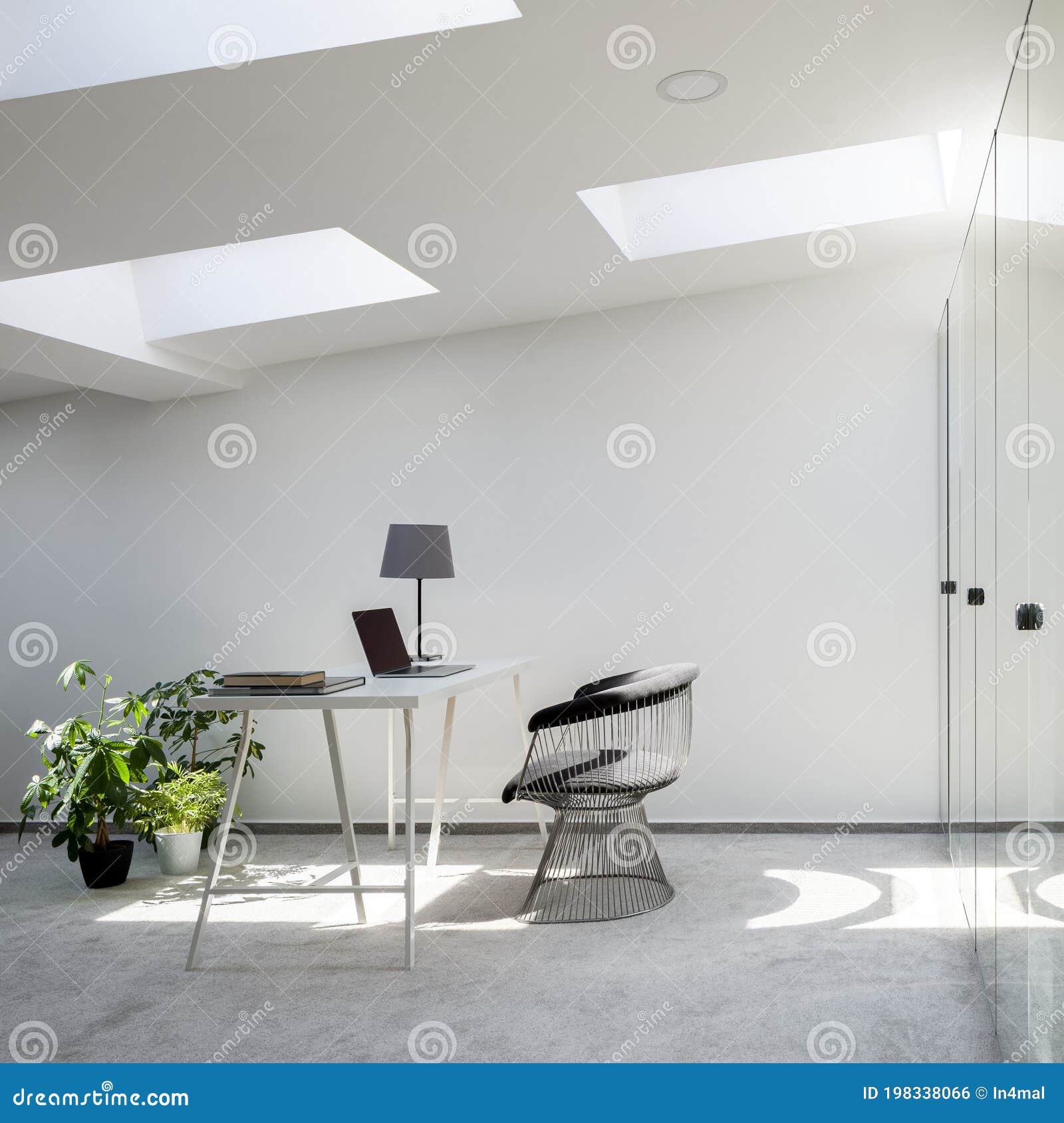Attic room with study area stock photo. Image of houseplant - 198338066