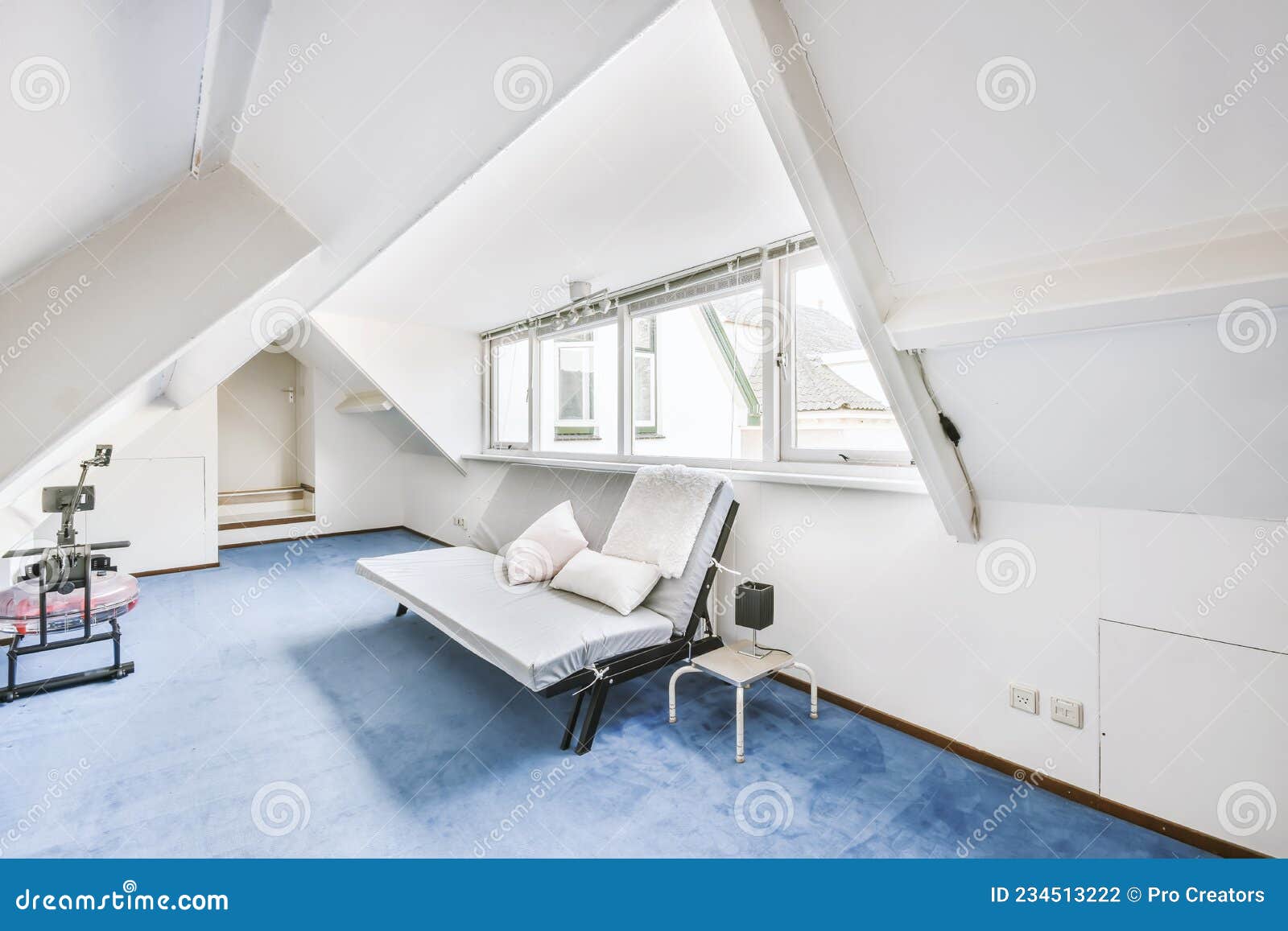 Attic with a Simulator and a Low Sofa Stock Photo - Image of real ...