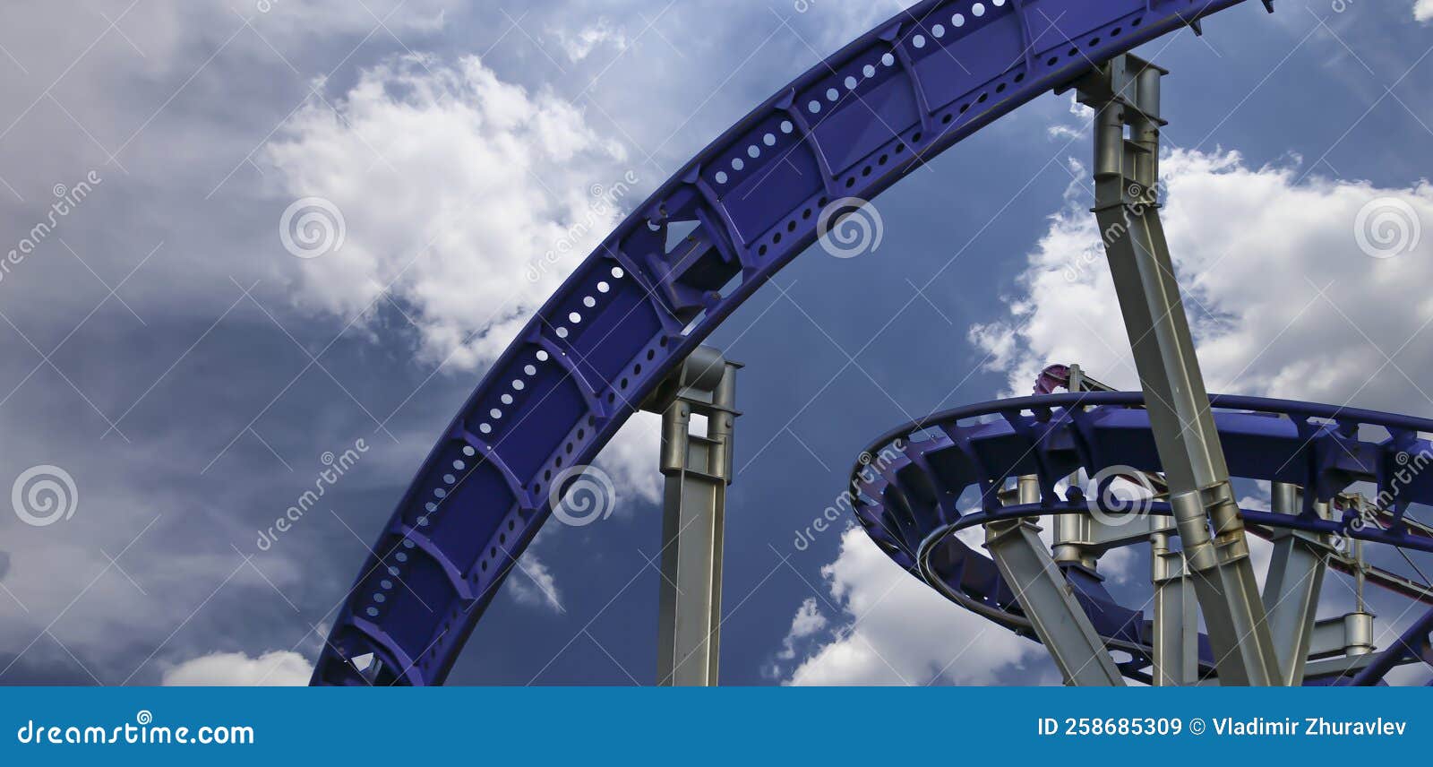 Attraction Roller-coaster Switchback on the Cloudy Sky Stock Image ...