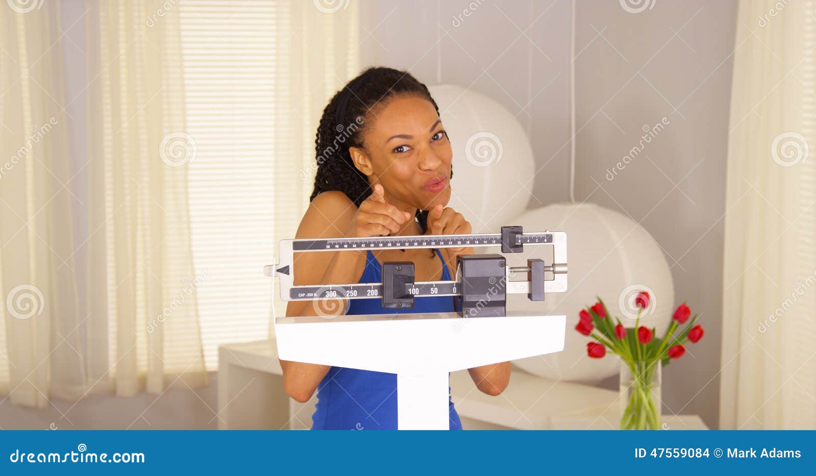 Attractive African Woman Dancing on Scales Stock Photo - Image of loss ...