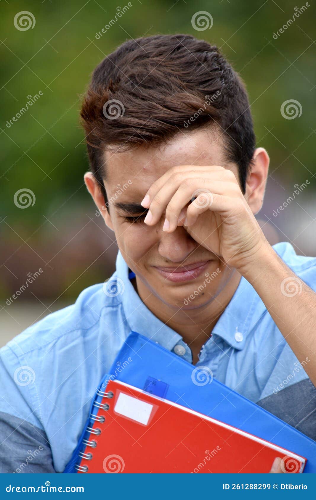 A Young Boy Student Crying stock image. Image of handsome - 261288299