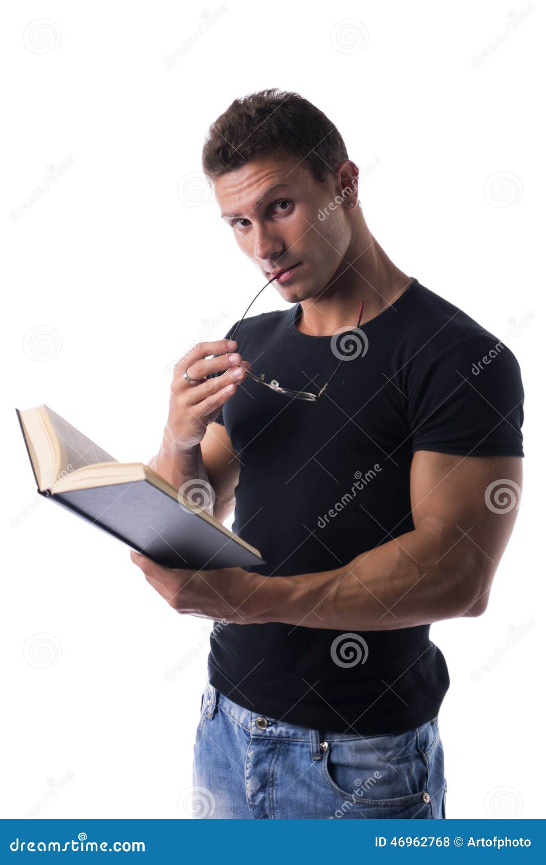 Attractive and Athletic Young Man Reading Book Stock Photo - Image of ...