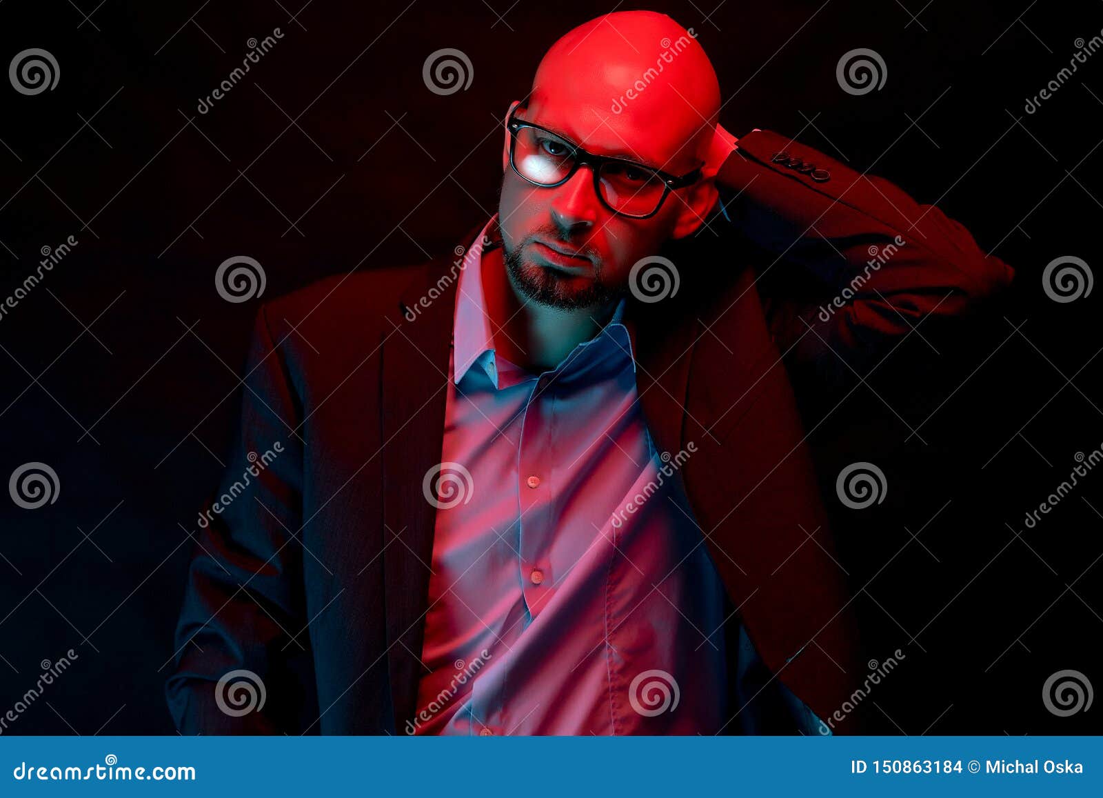 Attractive Bald Man with Beard with Glasses on Neon Light Background ...