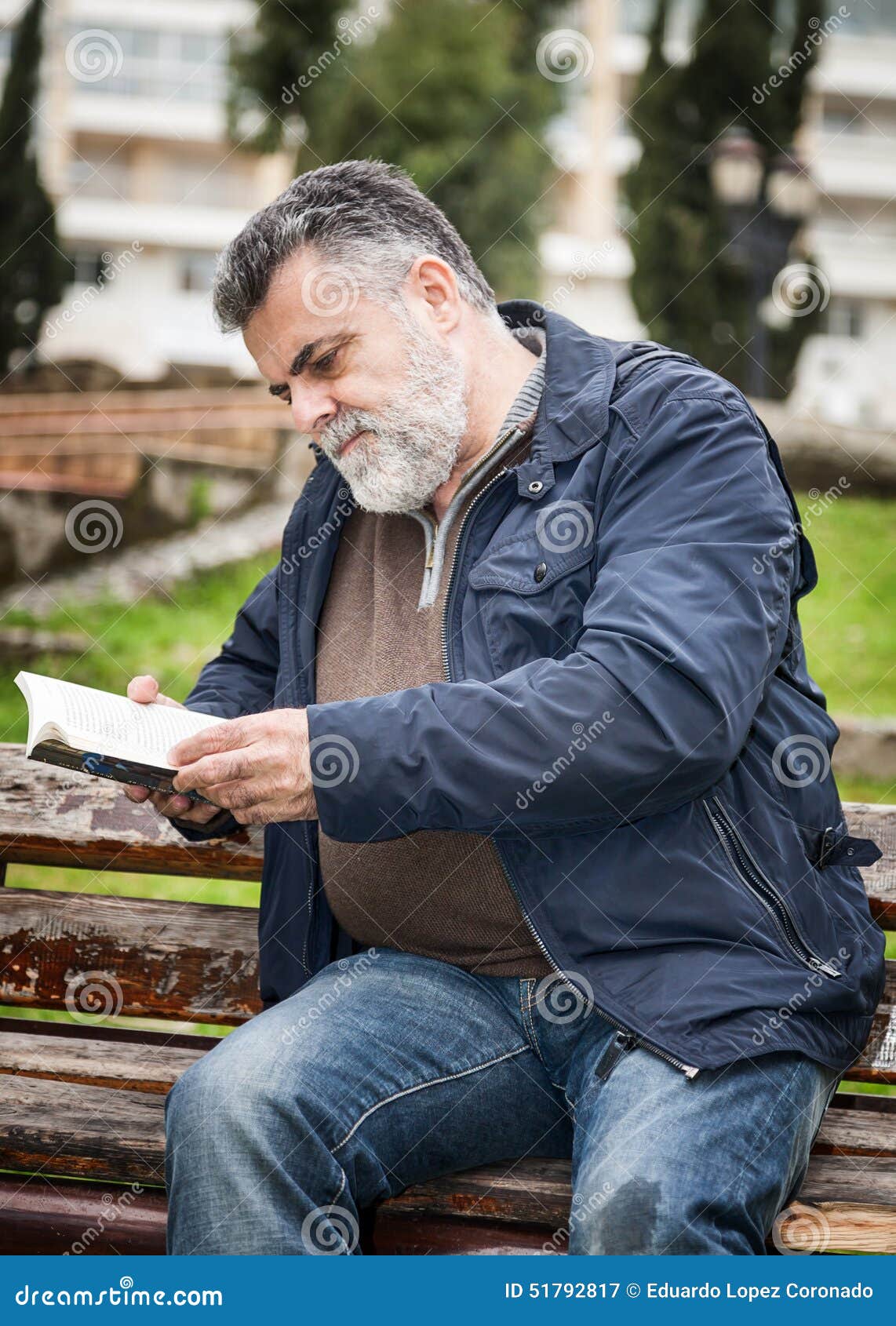 Attractive Bearded Man Reading in a Park Stock Image - Image of male ...