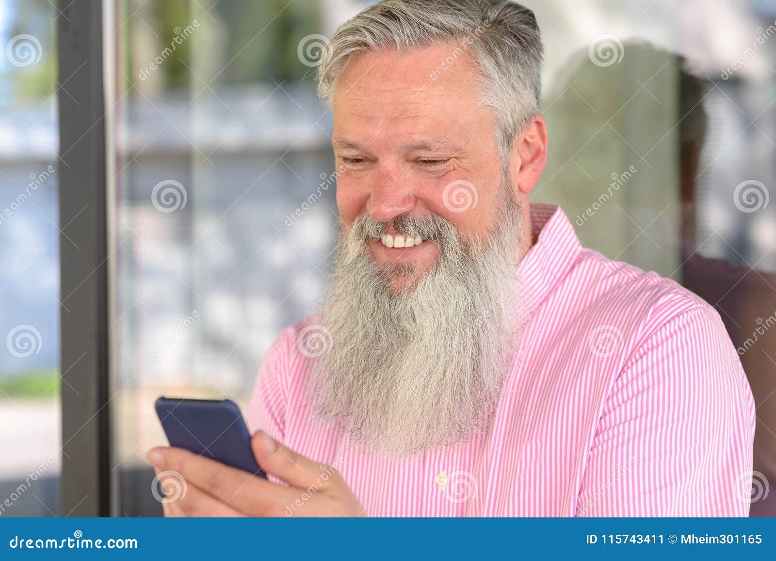 Attractive Bearded Man Reading A Text Message Stock Image Image Of