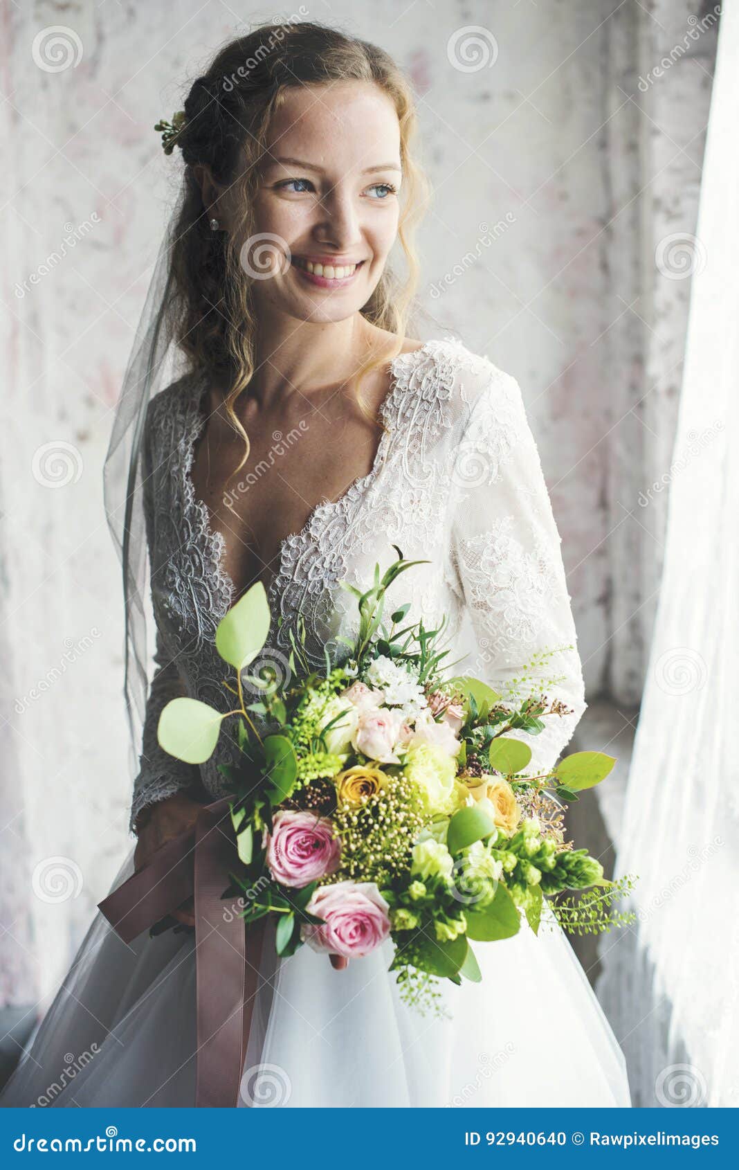 Attractive Beautiful Bride Holding Flowers Bouquet Stock Photo - Image ...