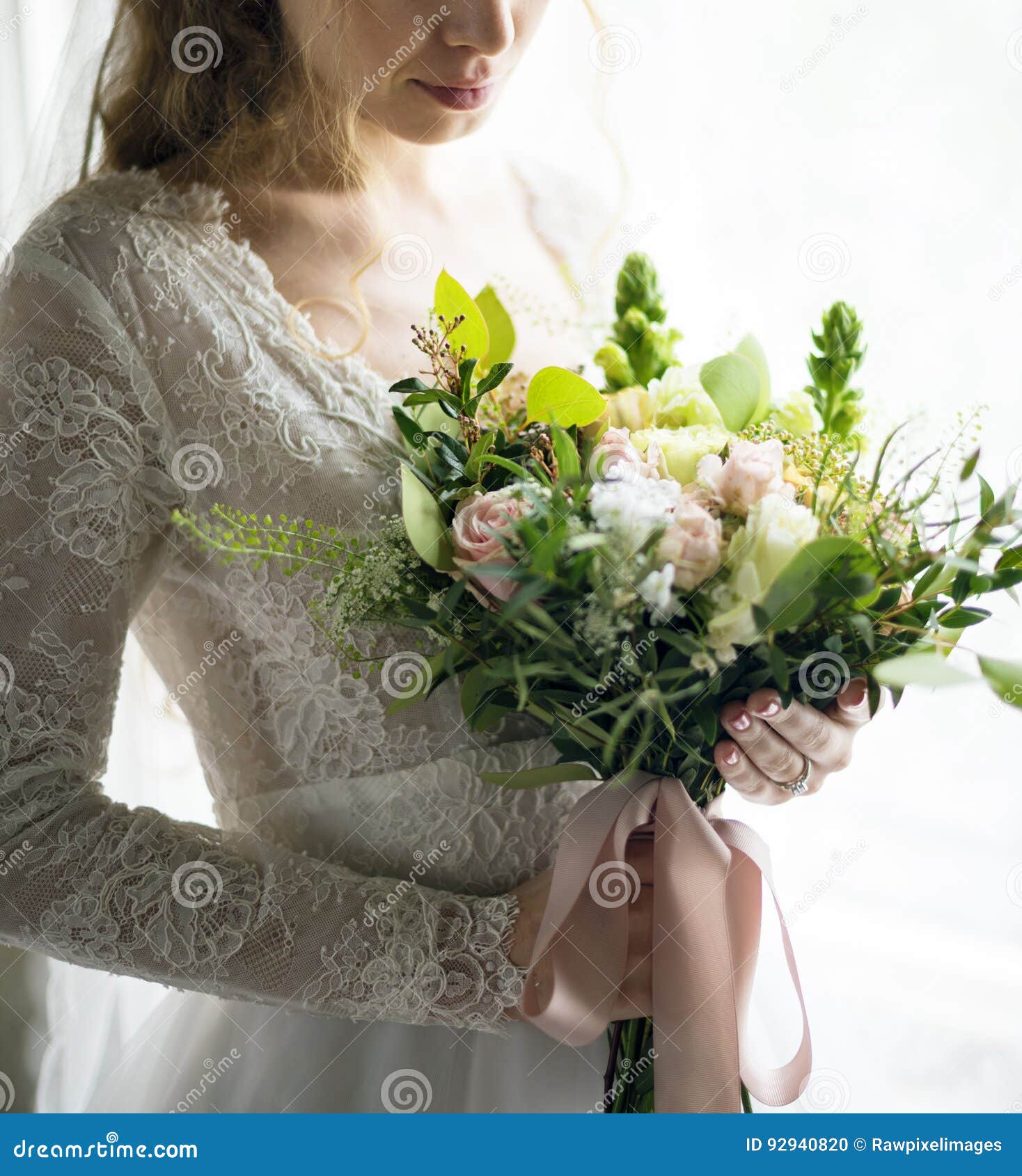 Attractive Beautiful Bride Holding Flowers Bouquet Stock Photo - Image ...