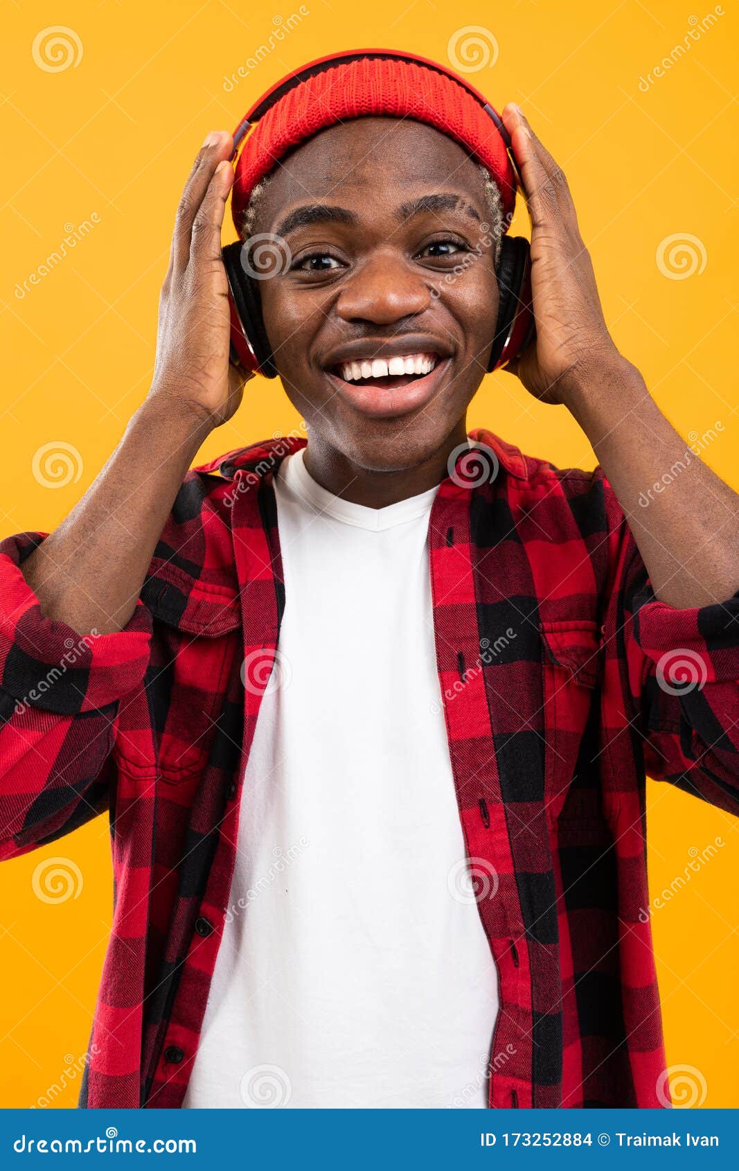 Attractive Black American Guy Listening To Music On Headphones Stock