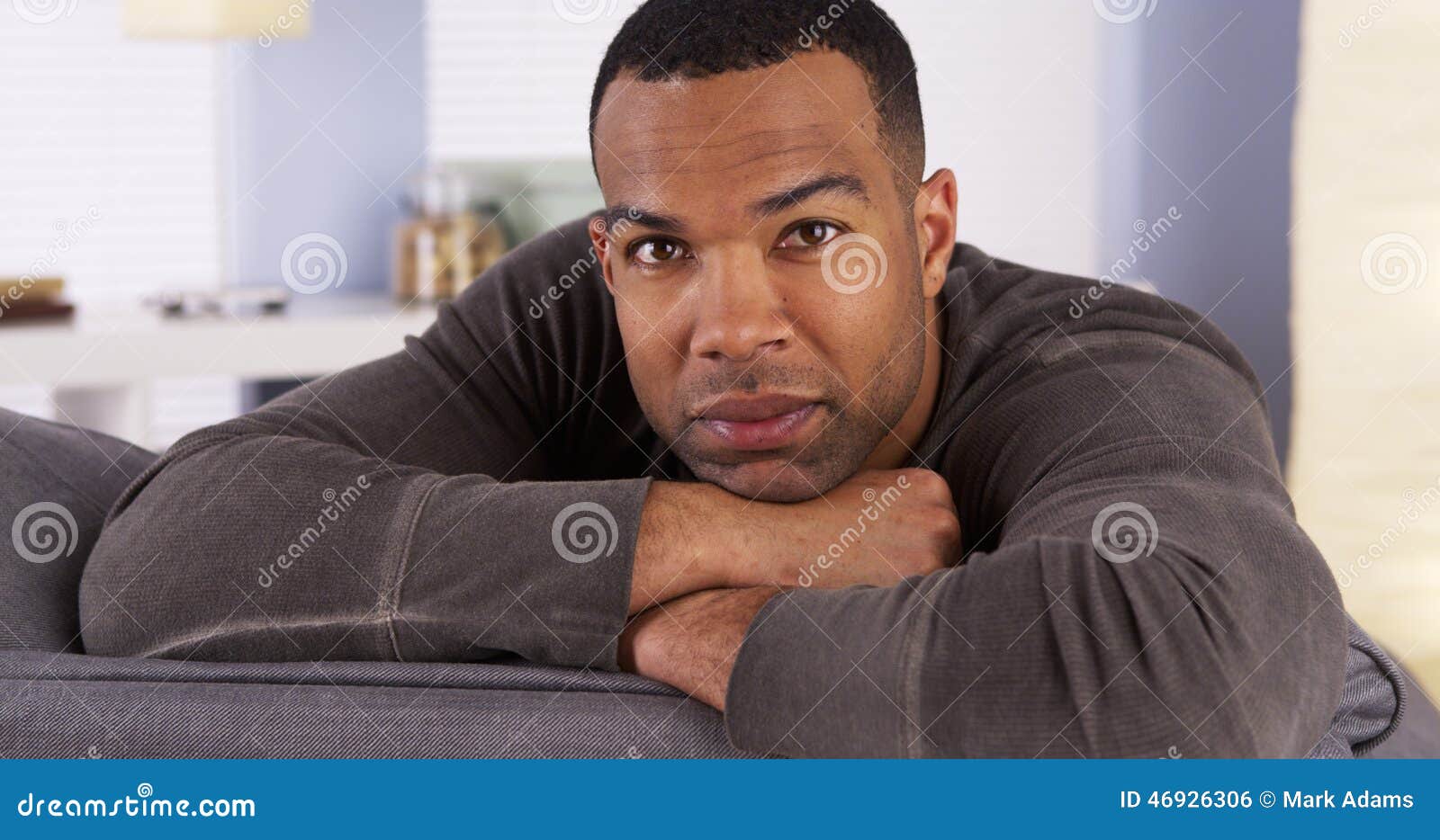 Attractive Black Man Resting on Couch Stock Photo - Image of african ...