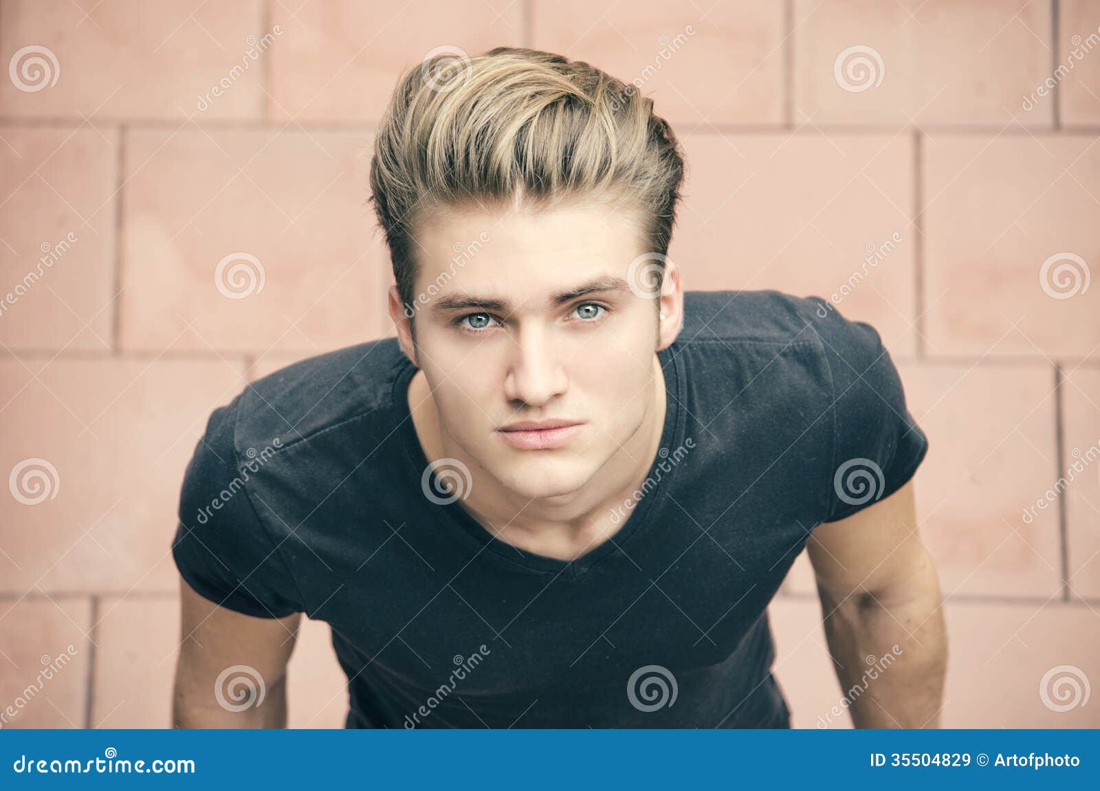 Attractive Blond Young Man Shot from Above, Looking Up Stock Image ...