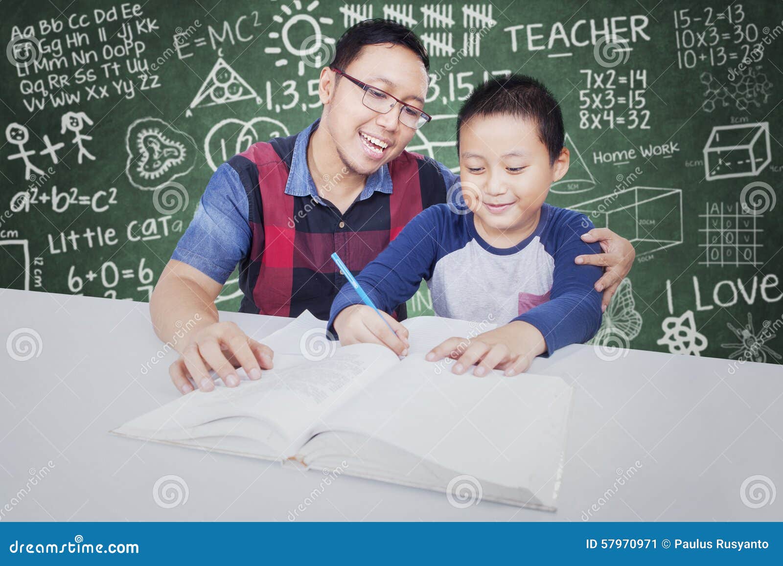 Attractive Boy Studying in the Class with Tutor Stock Image - Image of ...