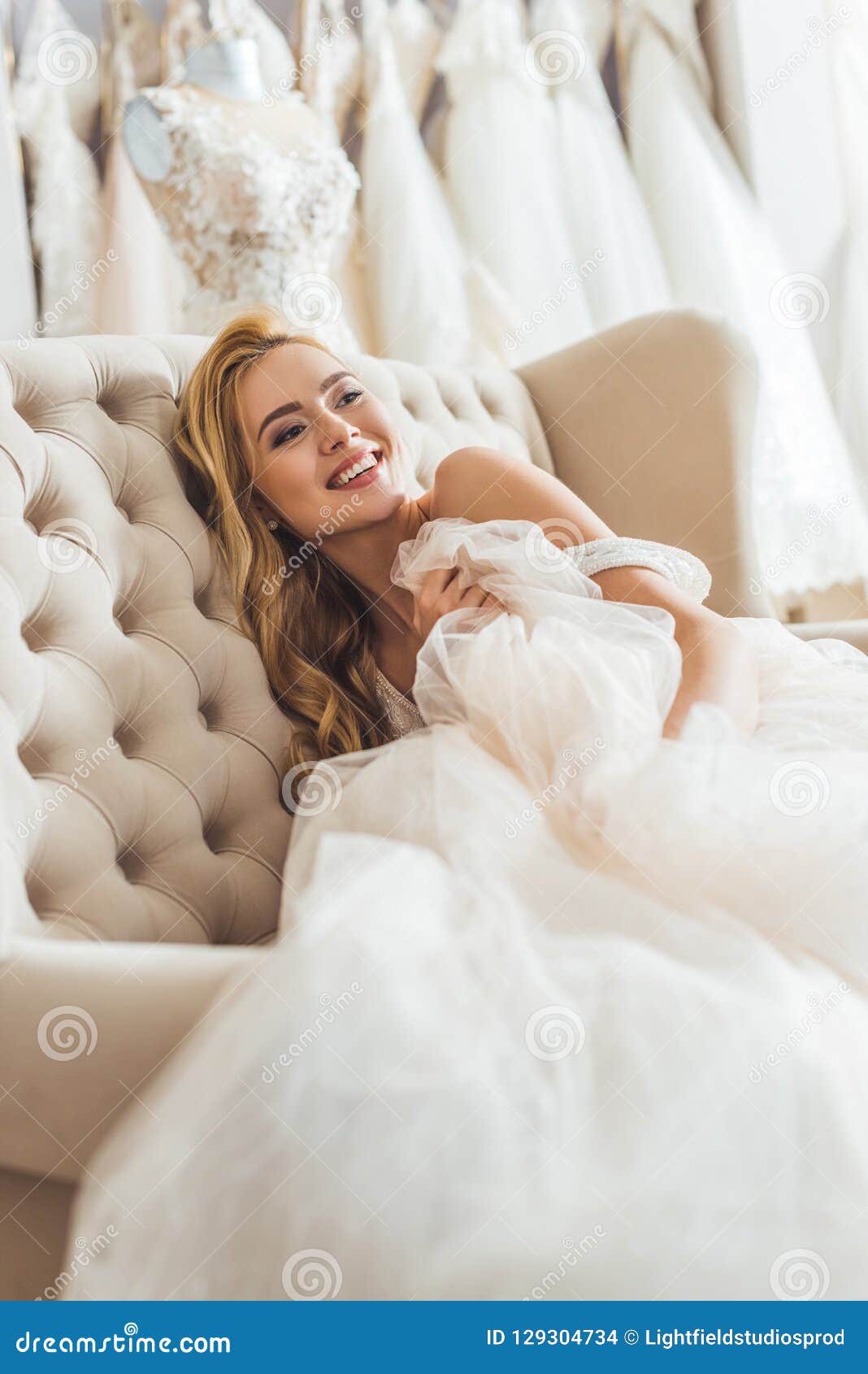 Attractive Bride Resting on Sofa Stock Photo - Image of elegance ...
