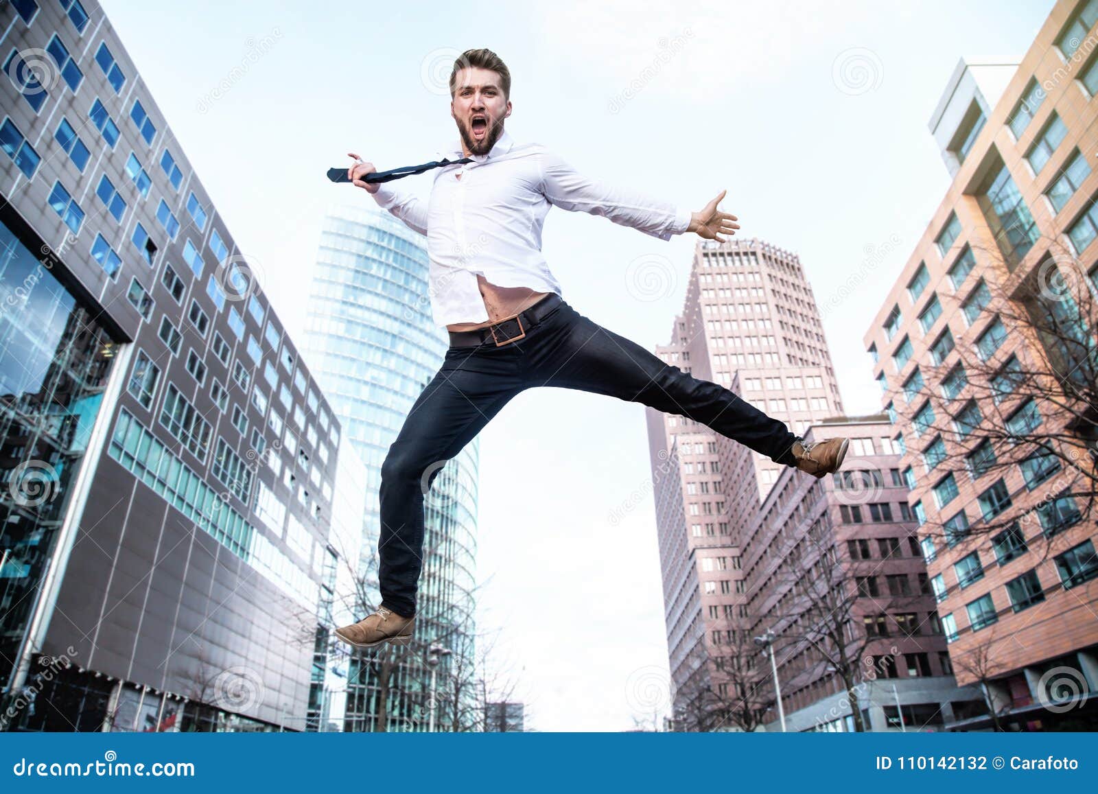 Attractive Business Man is Jumping in the Air Stock Photo - Image of ...
