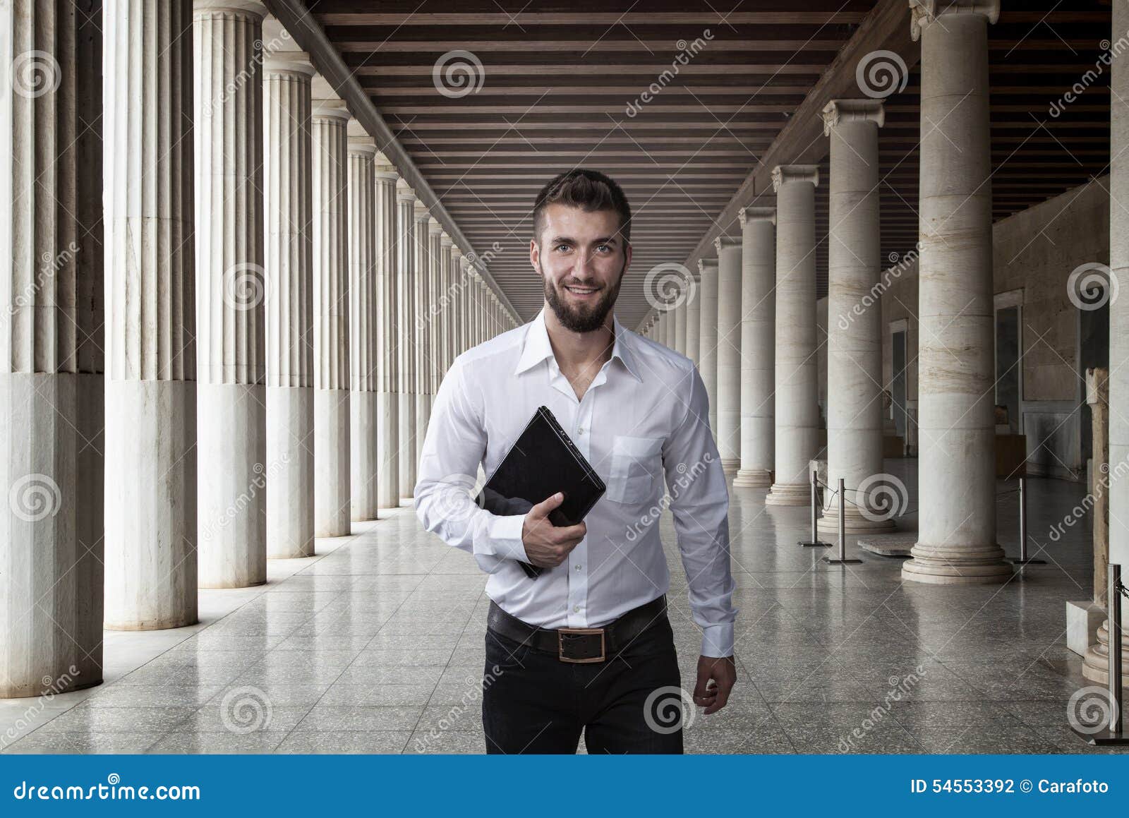 Attractive Business Man with a Notebook in His Hand Stock Photo - Image ...