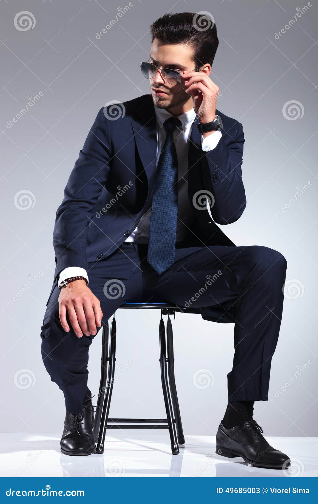 Attractive Business Man Sitting on a Stool Stock Image - Image of ...