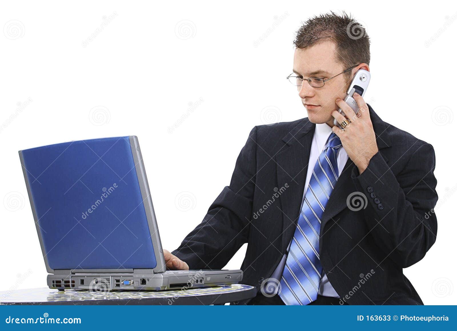 Attractive Business Man in Suit with Computer and Cellphone Stock Image ...